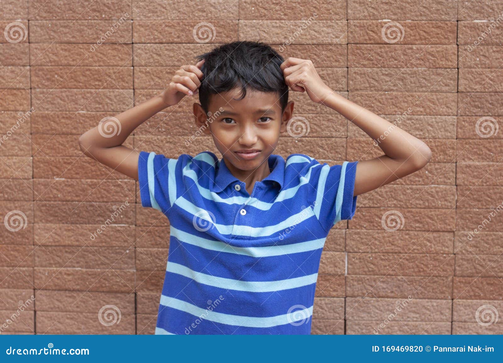 Boy Stand and Use Hand Scratch His Head with Puzzling. Stock Photo ...