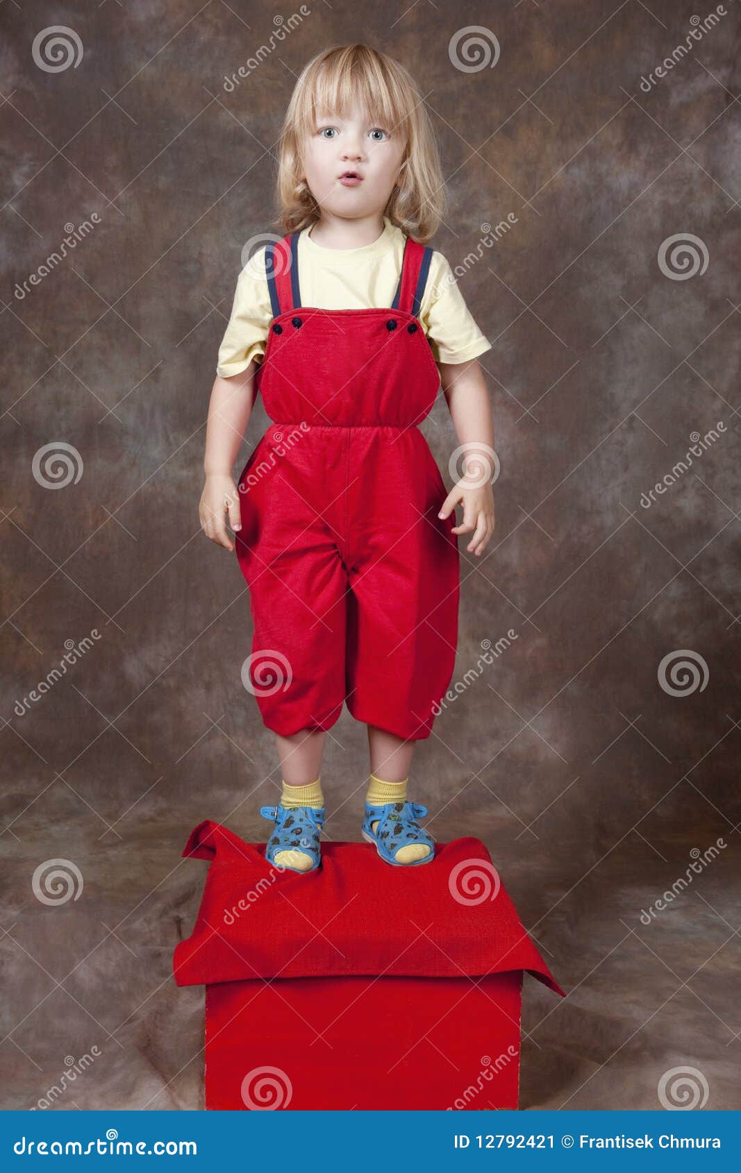 Boy standing on a box stock image. Image of beautiful - 12792421