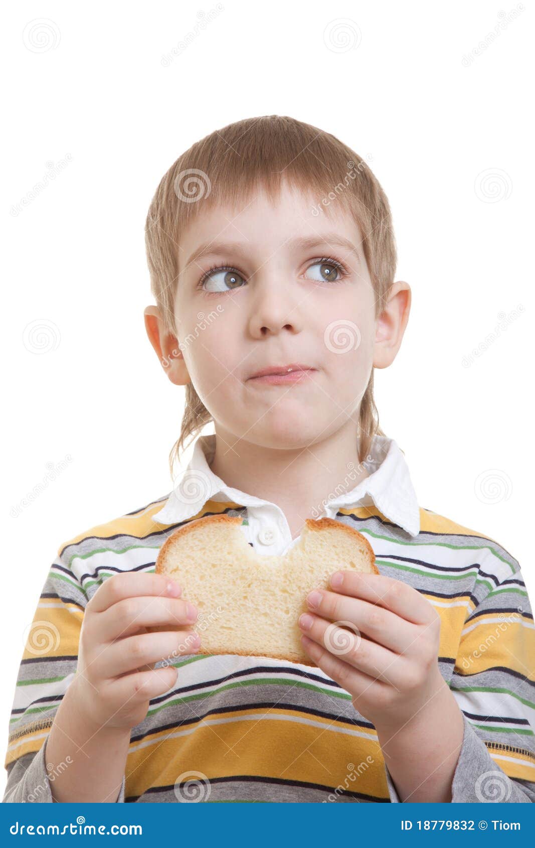 Boy Standing with Piece of Bread Stock Photo - Image of person ...