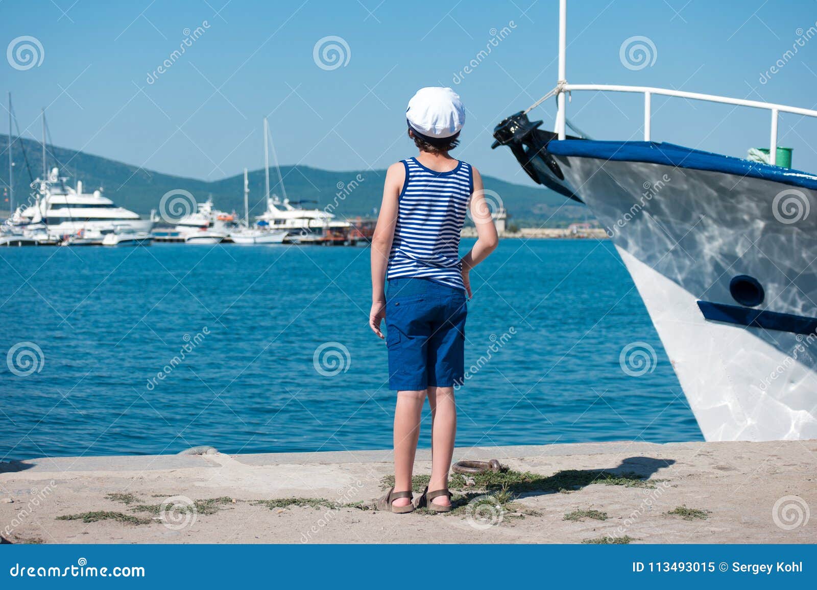 The Boy is Standing on the Pier Stock Image - Image of water, travel ...