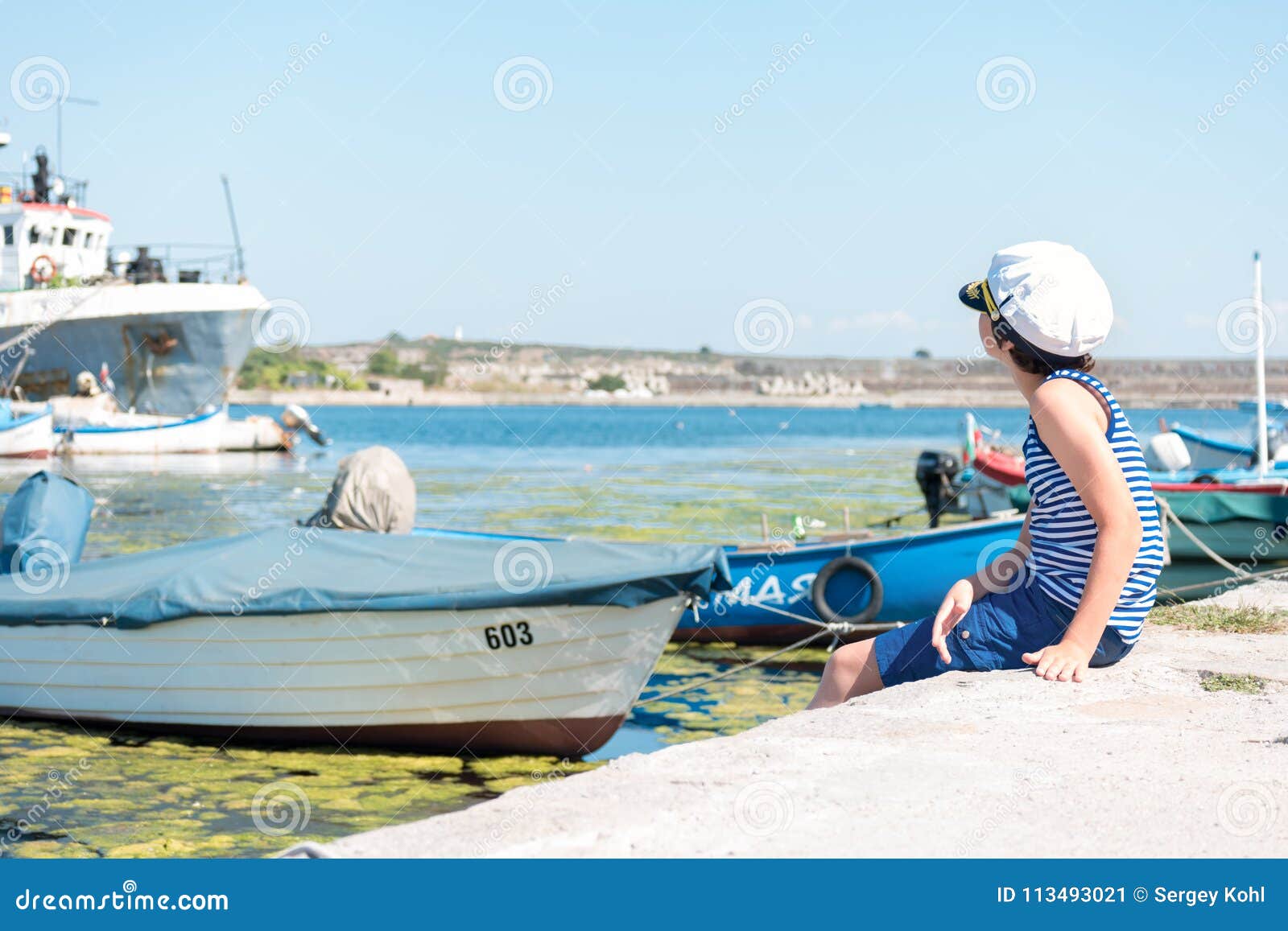 The Boy is Standing on the Pier Stock Image - Image of lifestyle ...