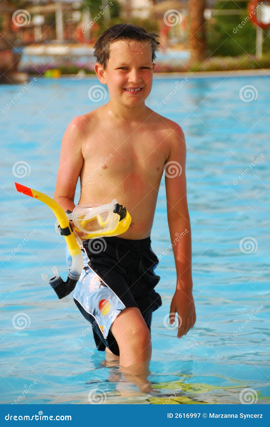 Boy standing in a pool stock image. Image of goggles, play - 2616997