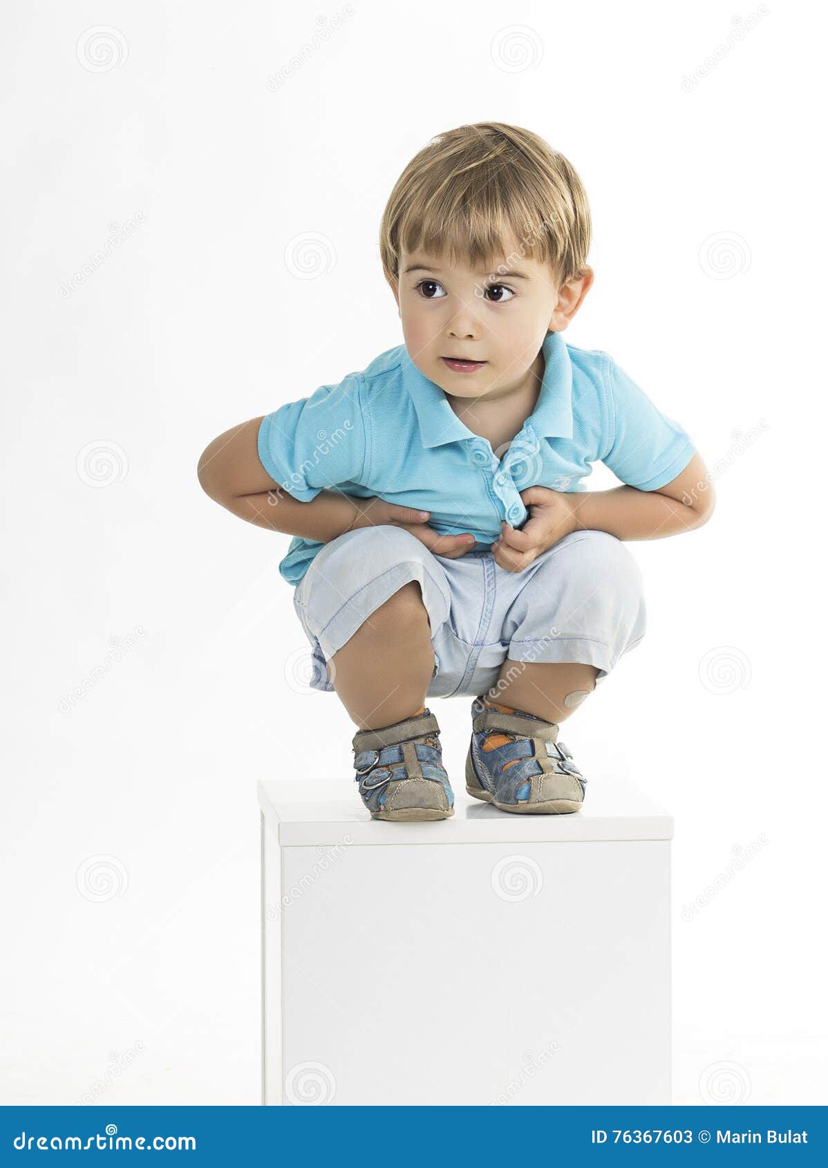 Boy Standing Still on a Cube Stock Image - Image of playing, still ...