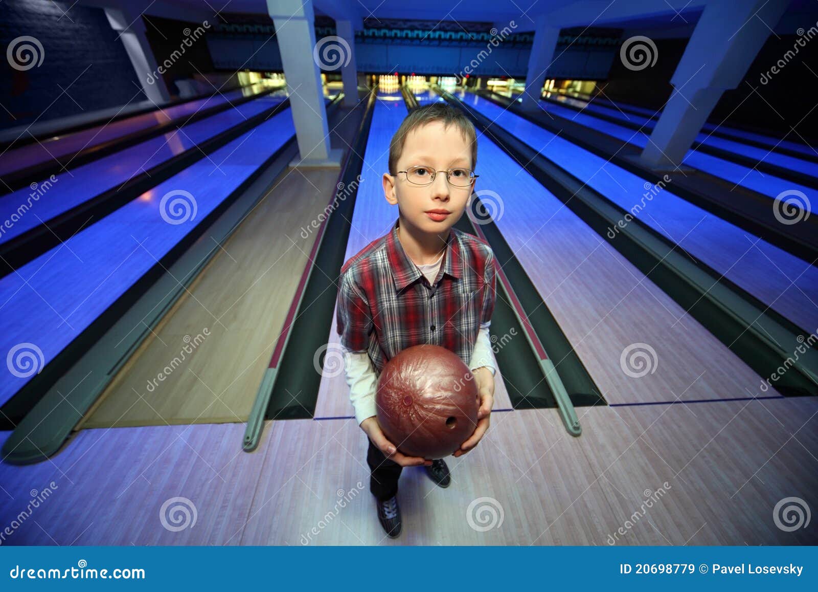 Boy Stands with Ball for Bowling Stock Image - Image of concentration ...
