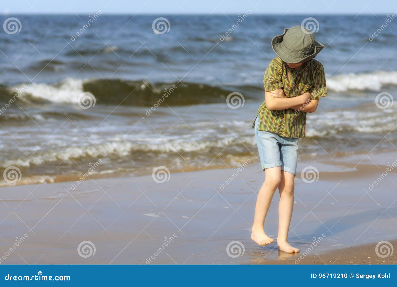 The Boy Stands on the Sandy Beach. Stock Photo - Image of bathing ...