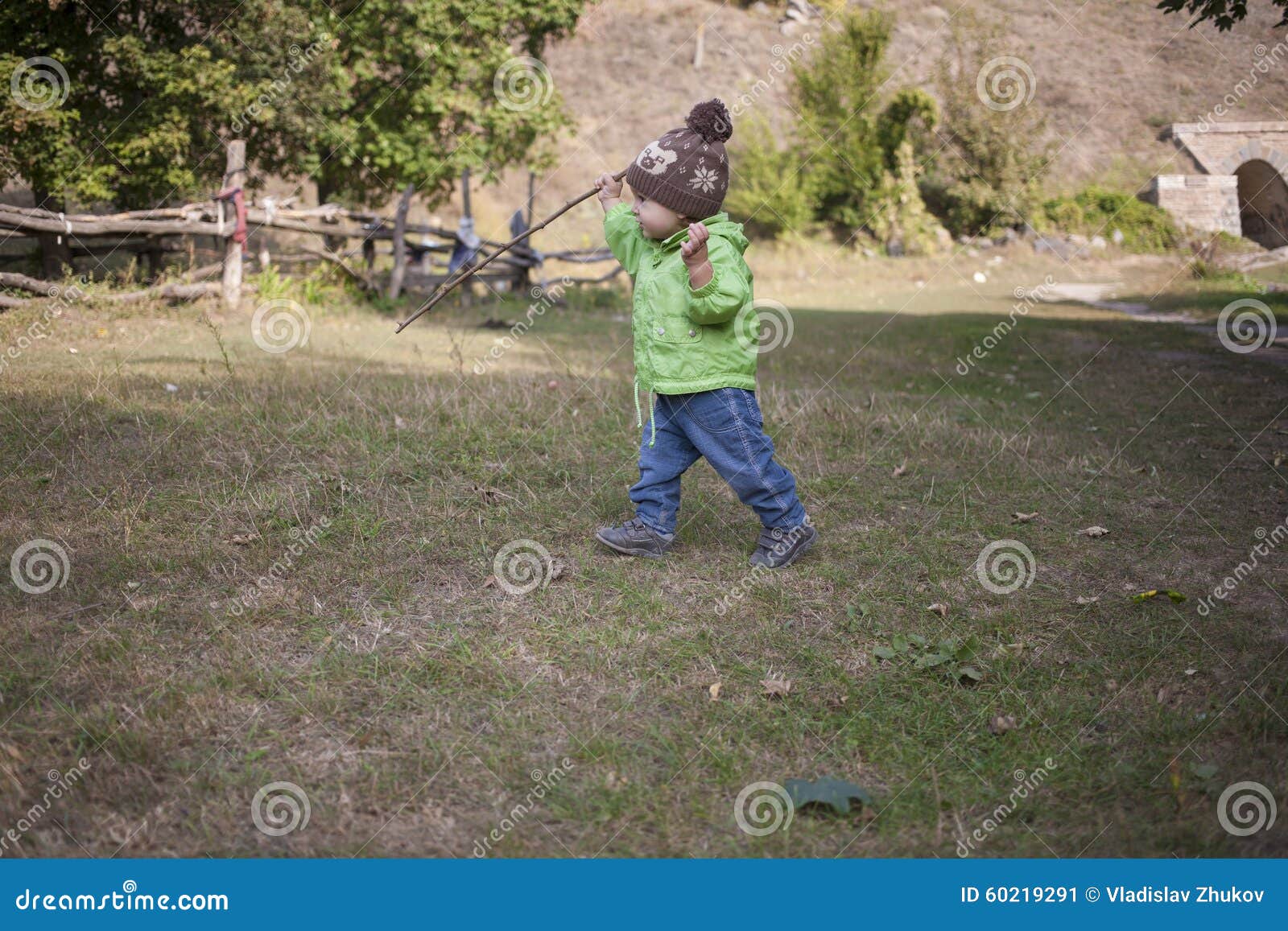 A boy with a stick. stock image. Image of beautiful, road - 60219291