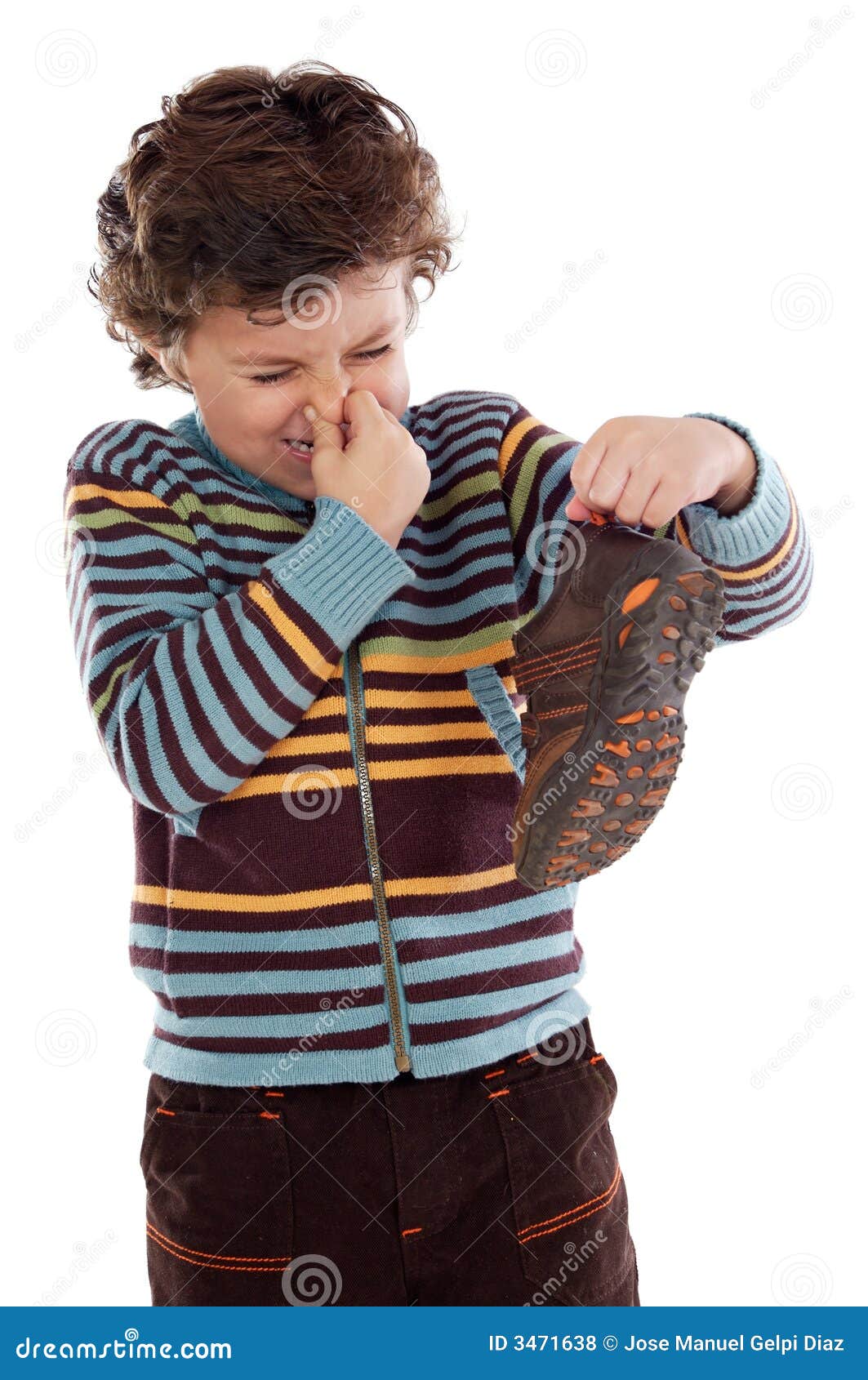 Boy with stinky shoe stock photo. Image of footwear, boots - 3471638