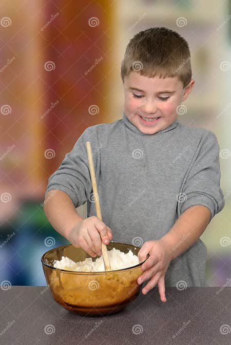 Boy Stirring Batter stock image. Image of pleasure, working - 22006387