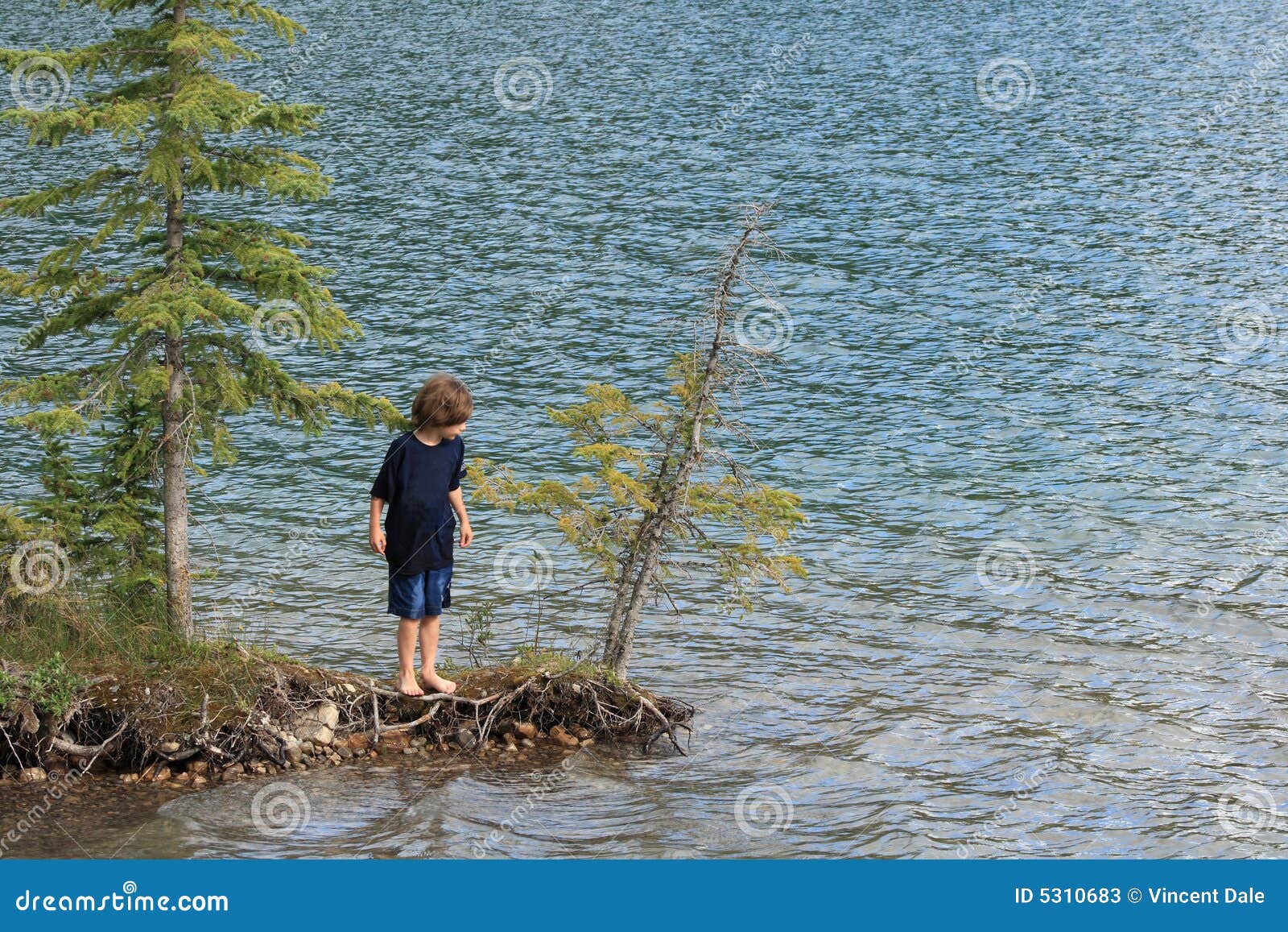 Boy Stranded stock image. Image of island, lake, laid - 5310683