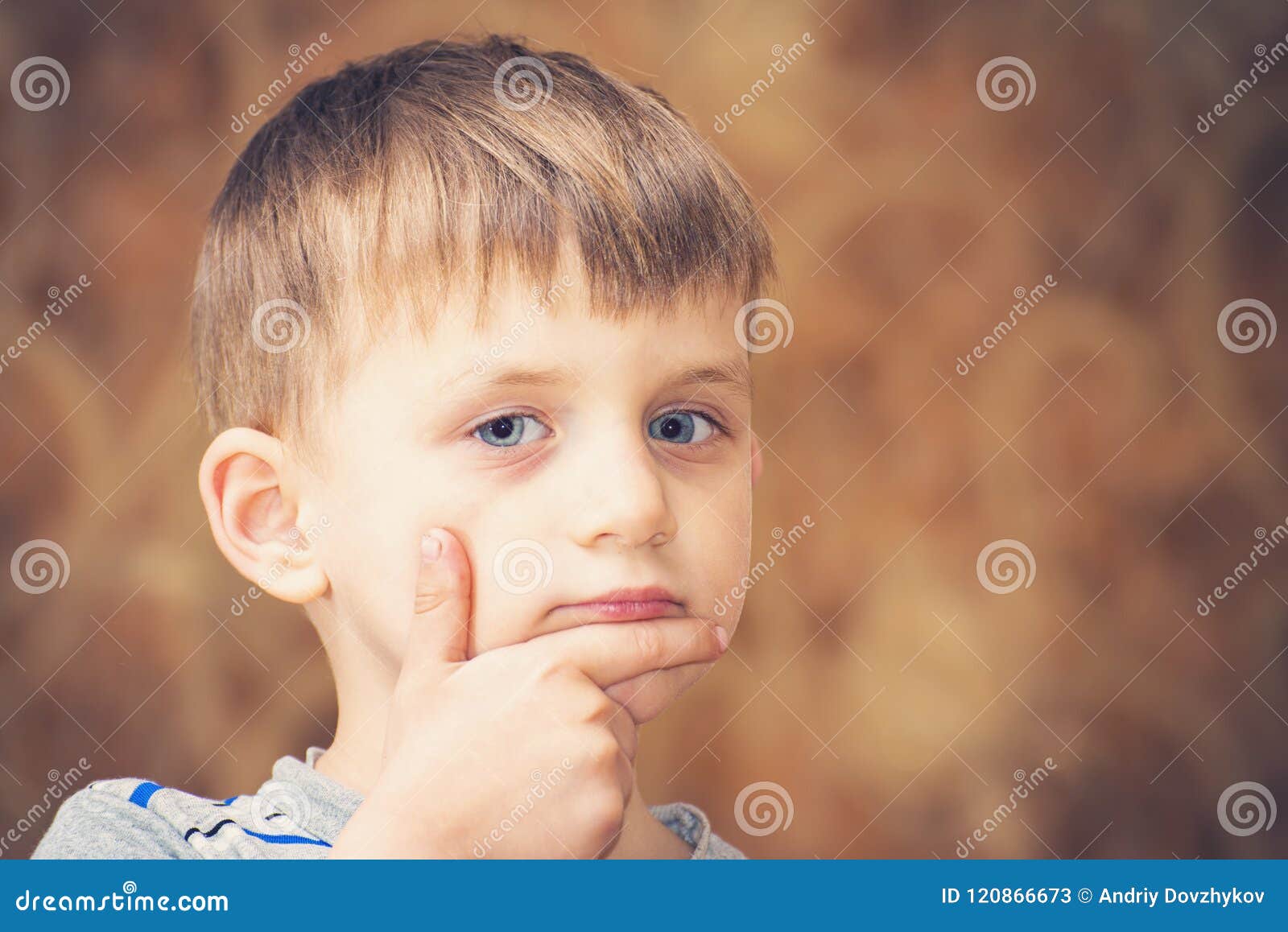 A Boy Strongly Emotional Shows a Different Face To the Camera Stock ...