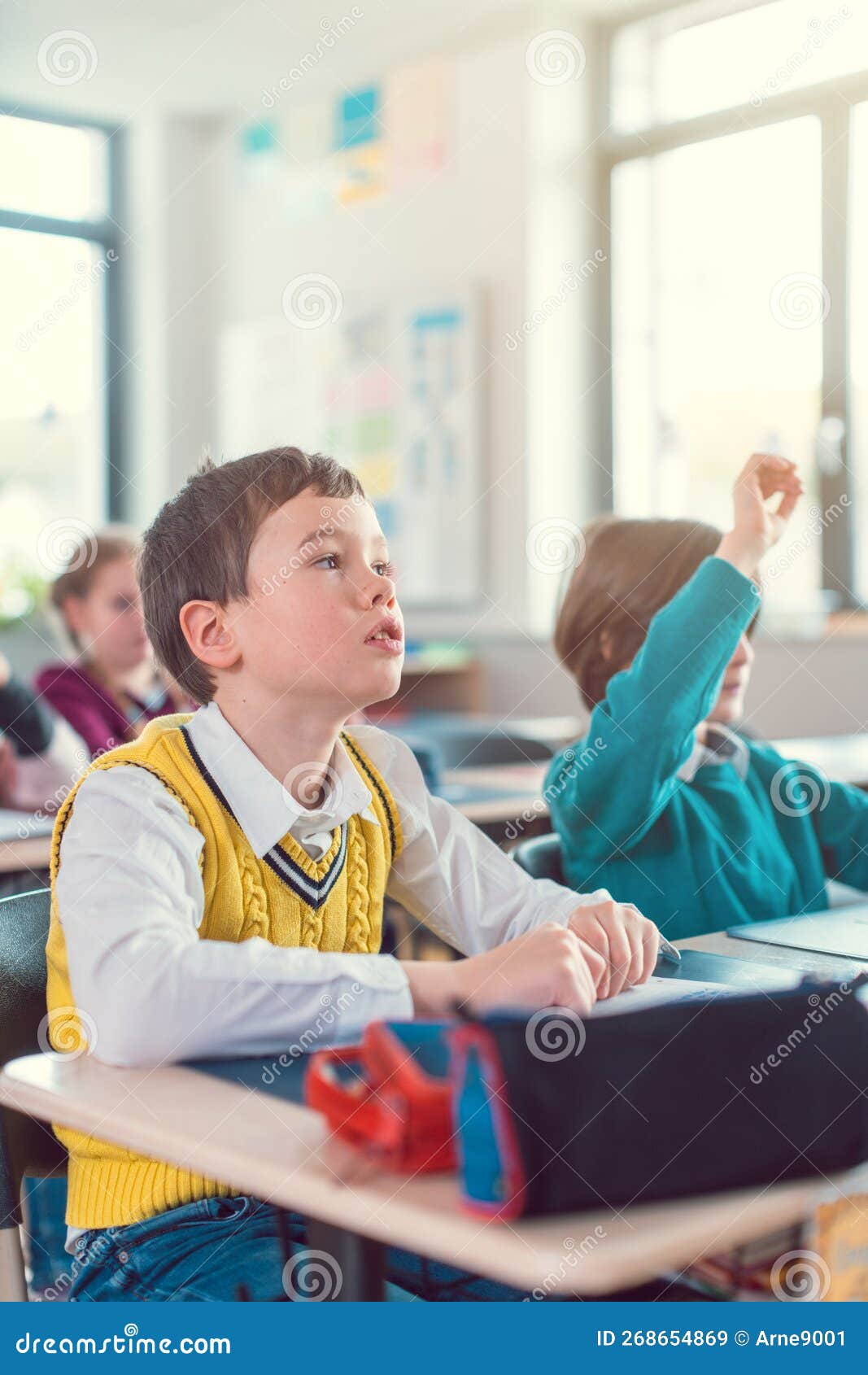 Boy Student in Class Knowing an Answer Raising His Hand Stock Image ...