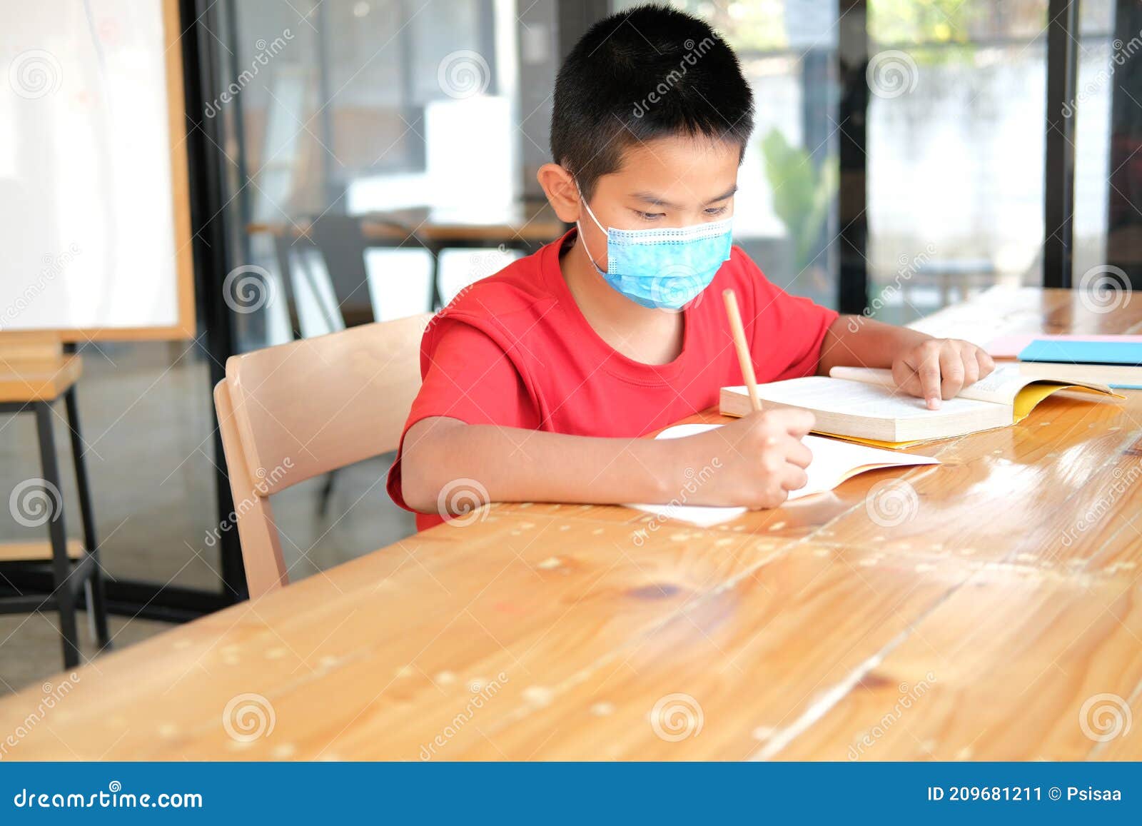 Boy Student Wearing Face Mask Studying Writing Notes Doing Homework ...