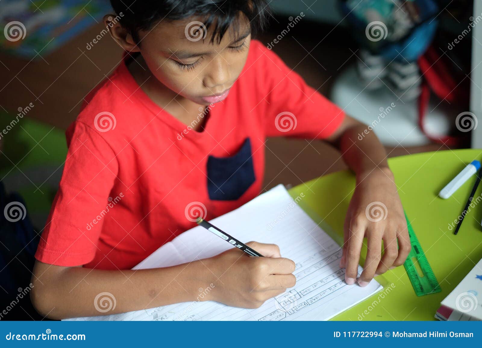 A boy study at his bedroom stock photo. Image of concentrate - 117722994