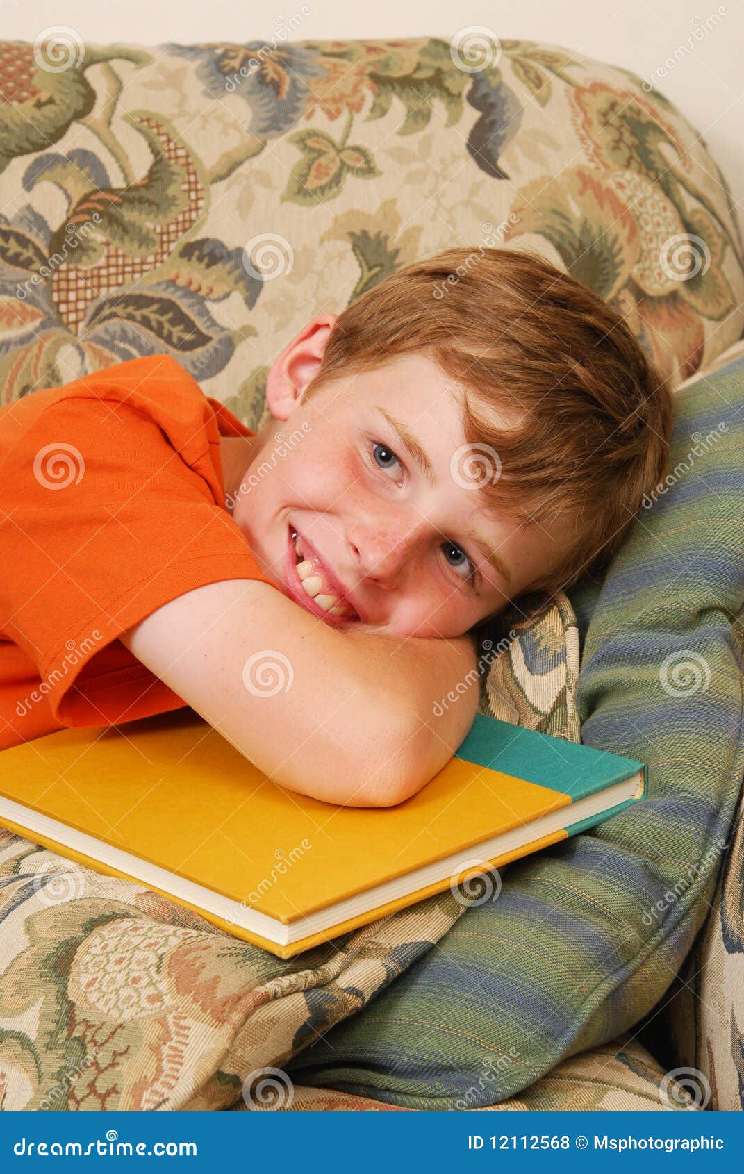 Boy Studying stock photo. Image of book, sofa, resting - 12112568