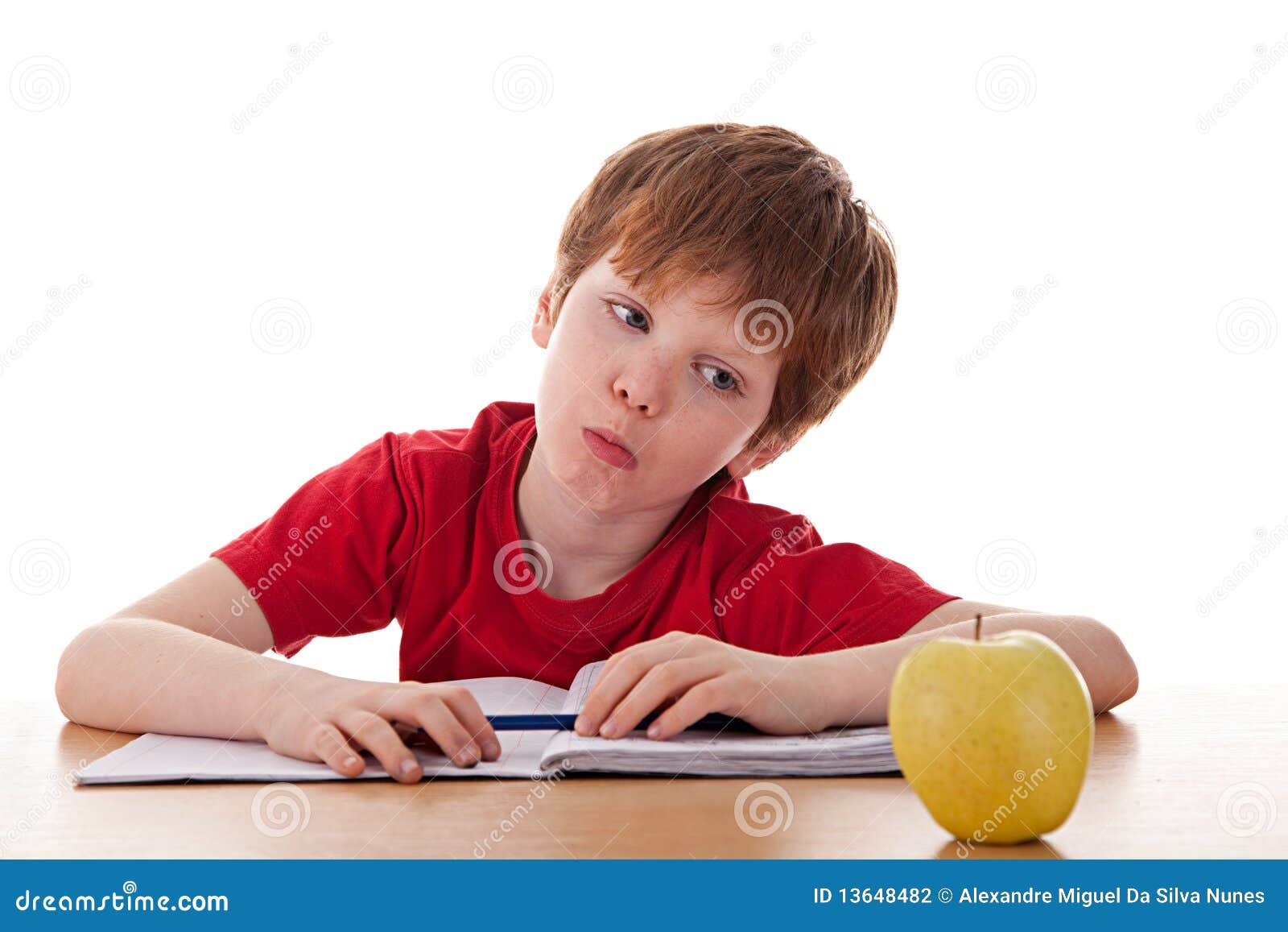 Boy Studying and Distracted with an Apple Stock Photo - Image of ...