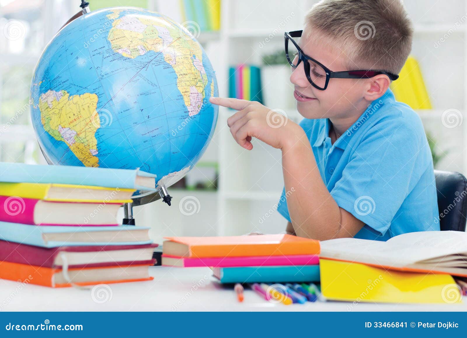 Boy studying geography stock image. Image of pile, knowledge - 33466841