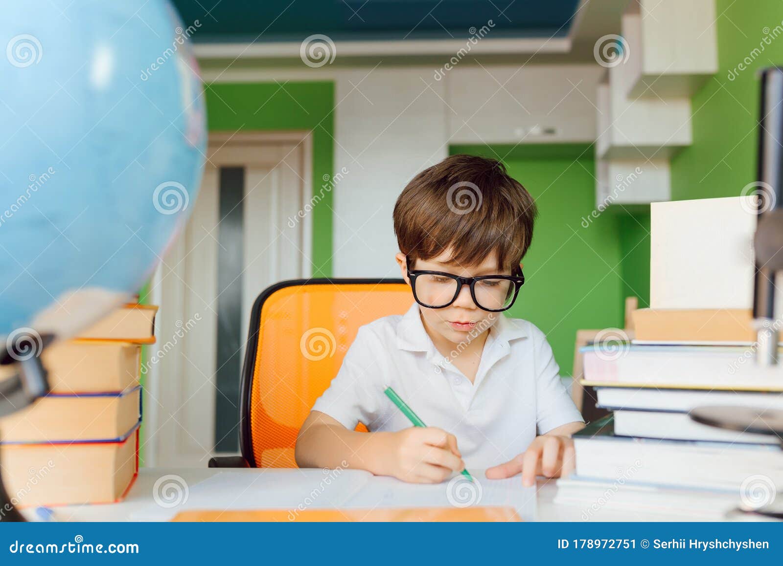 Boy Studying at Home and Doing School Homework. Distance Learning ...