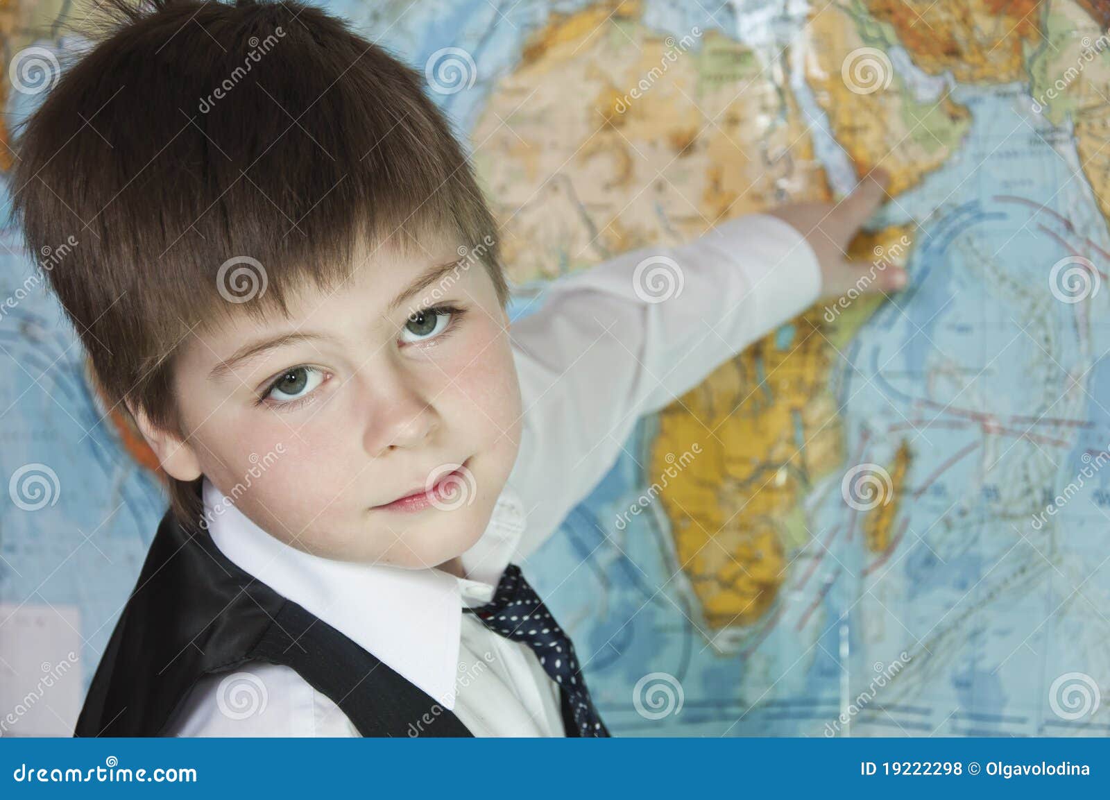 The Boy is Studying the Map of the World Stock Photo - Image of ...
