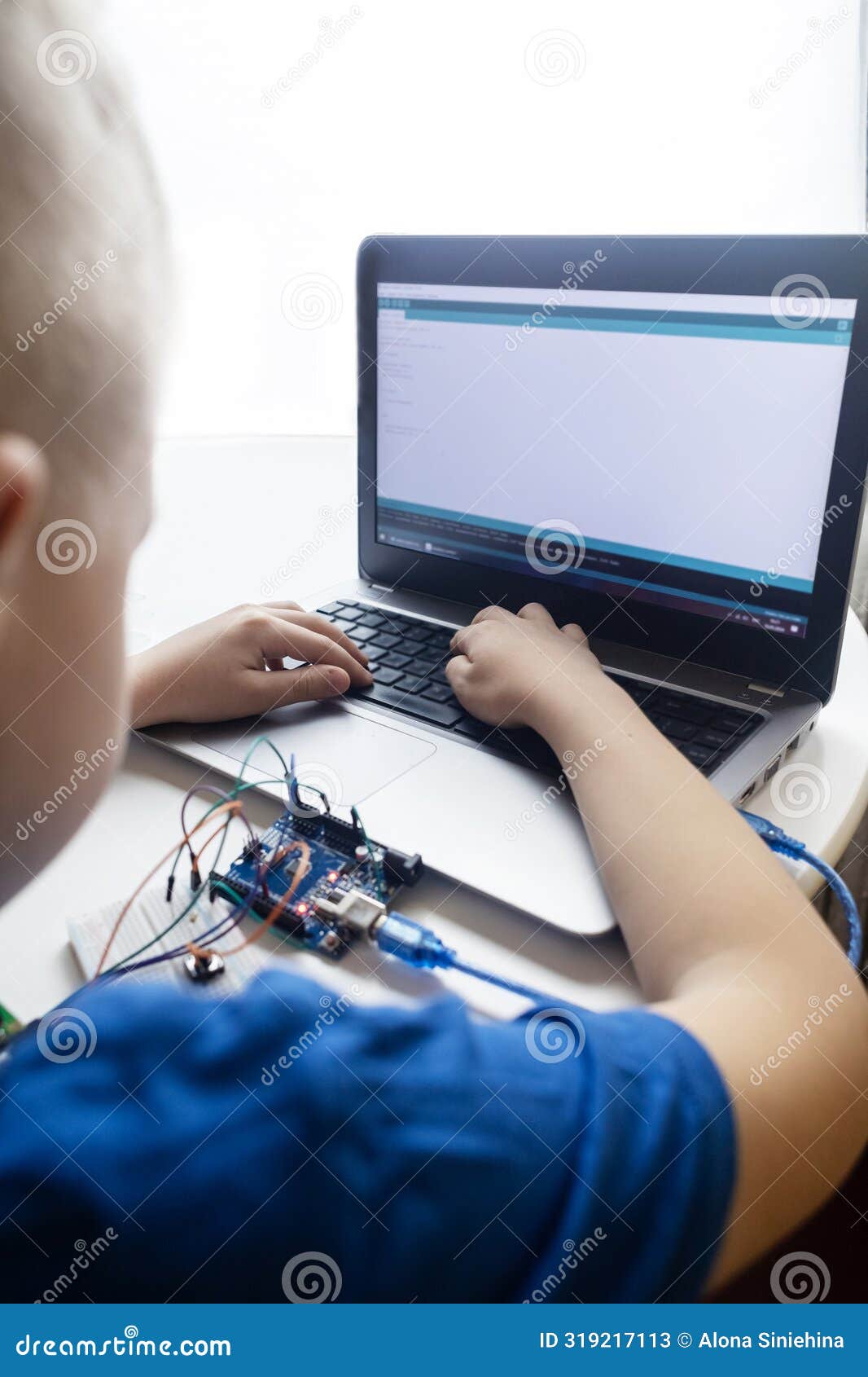 Programming for Children. the Boy is Studying Online at a Robotics ...