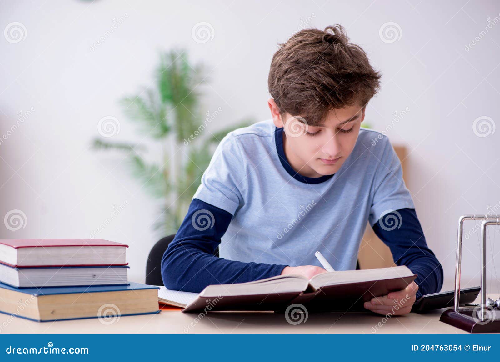 Schoolboy Studying Physics at Home Stock Photo - Image of experimenting ...