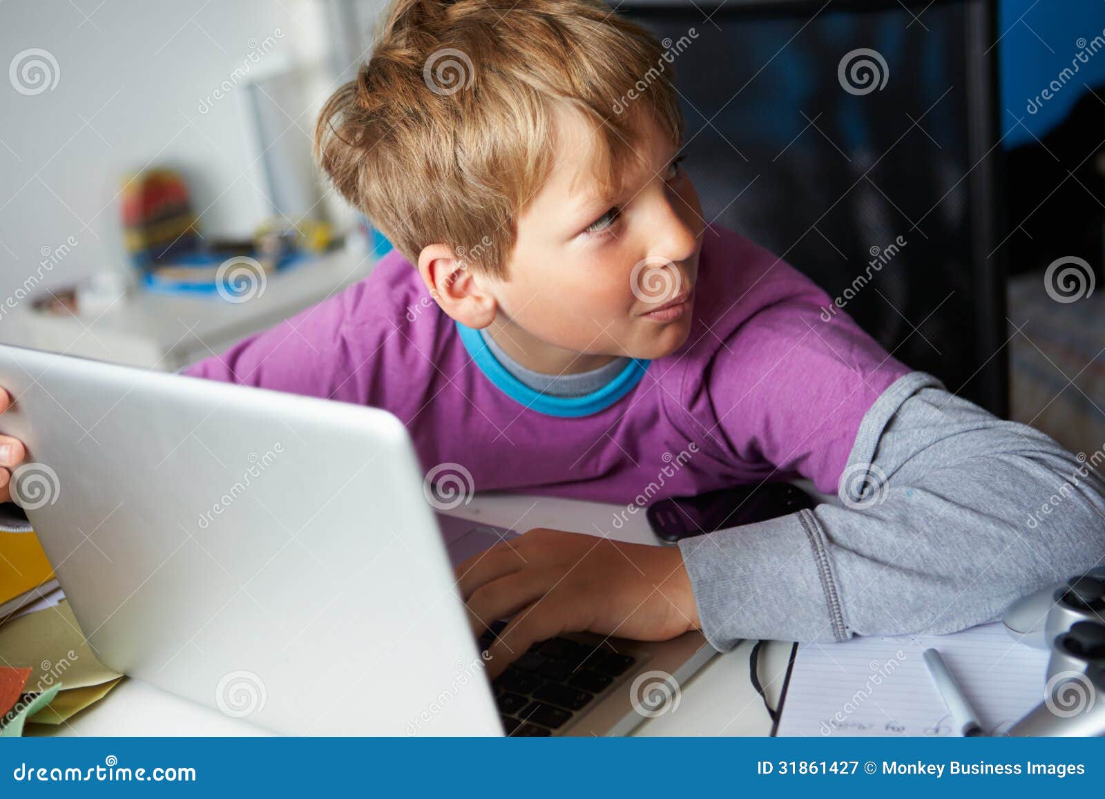 Boy Studying Using Laptop stock image. Image of social - 31861427