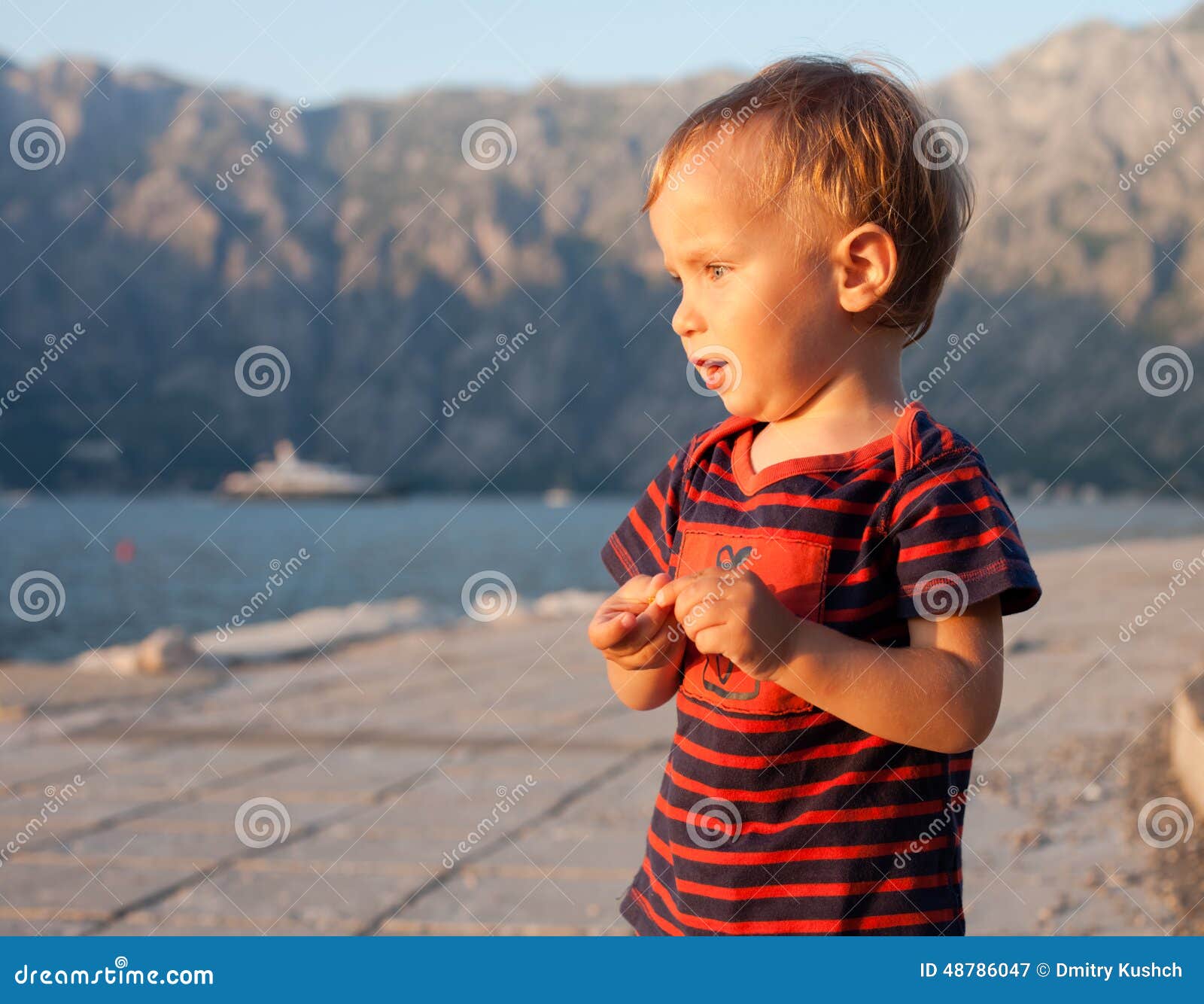 Boy in sun lights stock image. Image of blue, atmosphere - 48786047