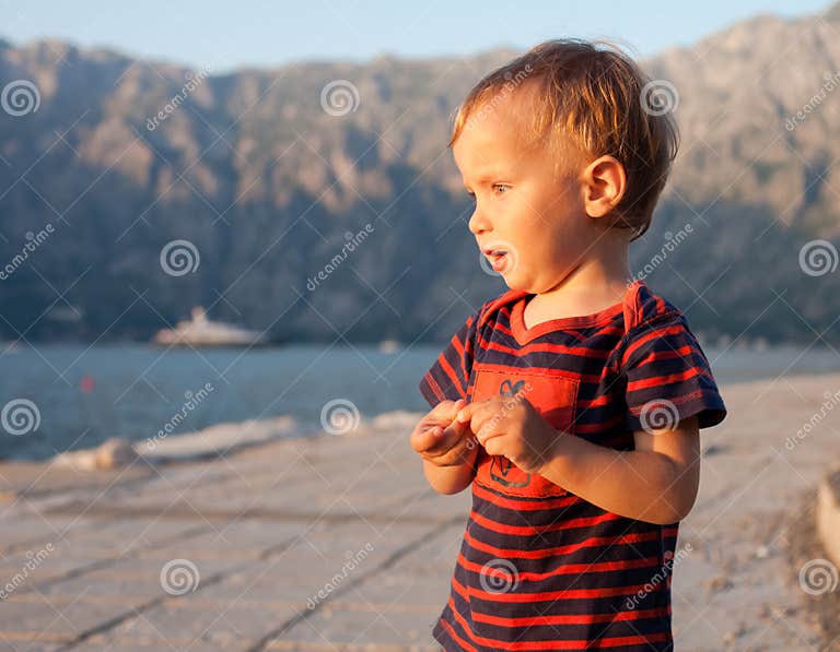 Boy in sun lights stock image. Image of blue, atmosphere - 48786047