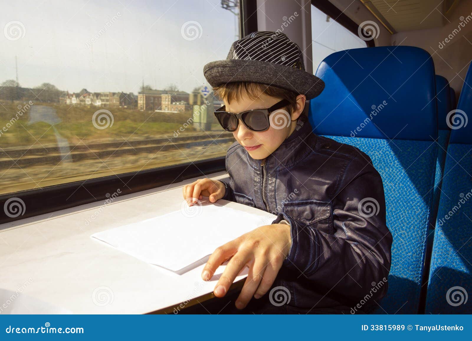Boy with Sunglasses Rides on a Train Stock Image - Image of railroad ...