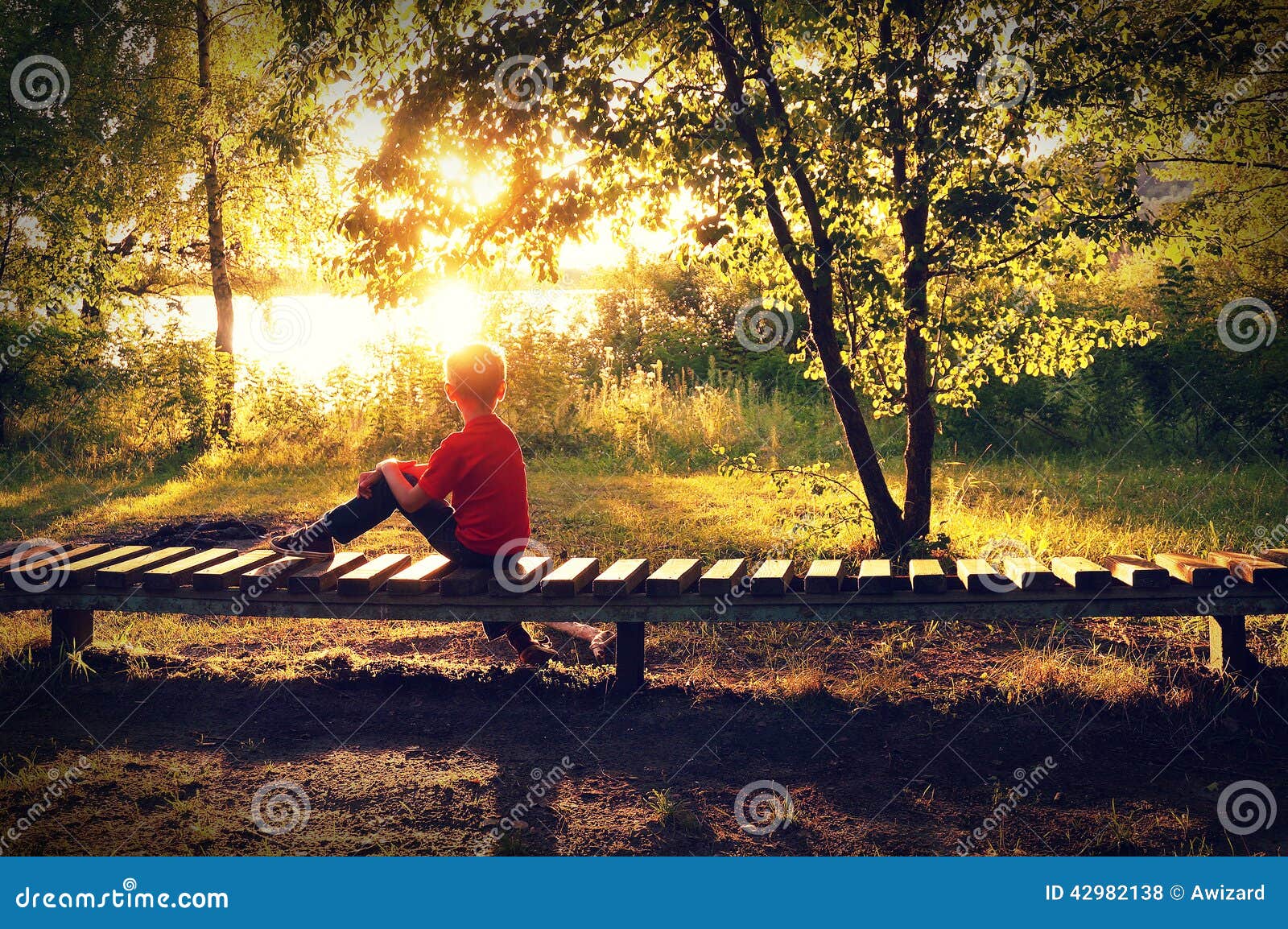 Boy at Sunset, Artistic Toned Image Stock Photo - Image of artistic ...