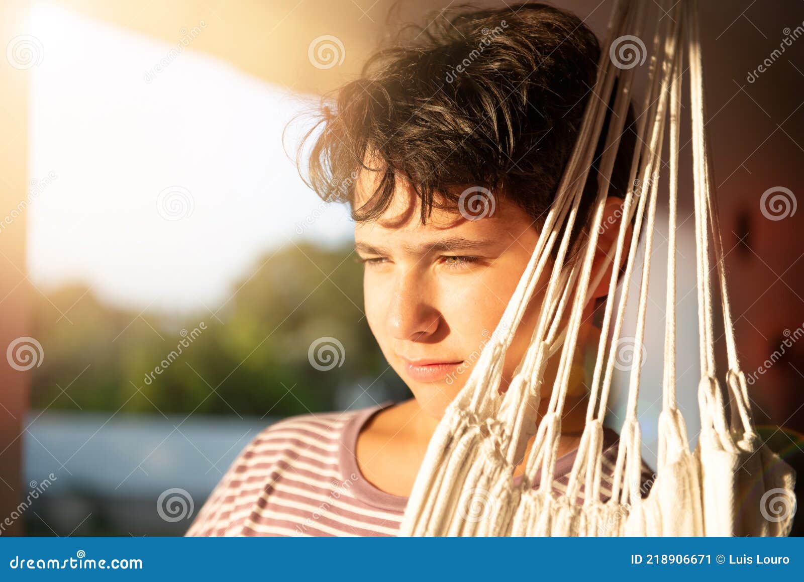 Boy at sunset portrait stock image. Image of summer - 218906671