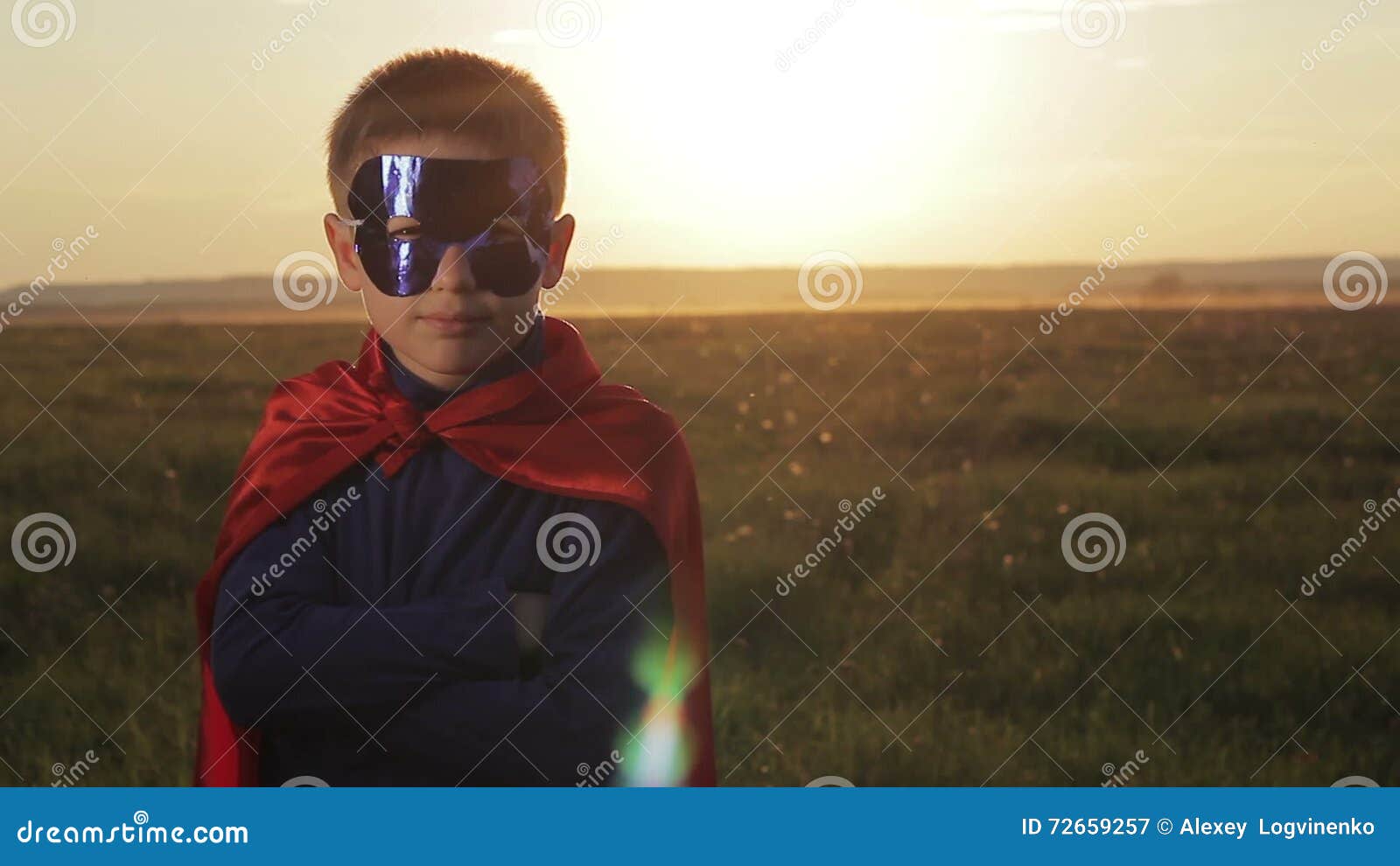 Boy Superhero in a Field at Sunset Stock Video - Video of muscles ...