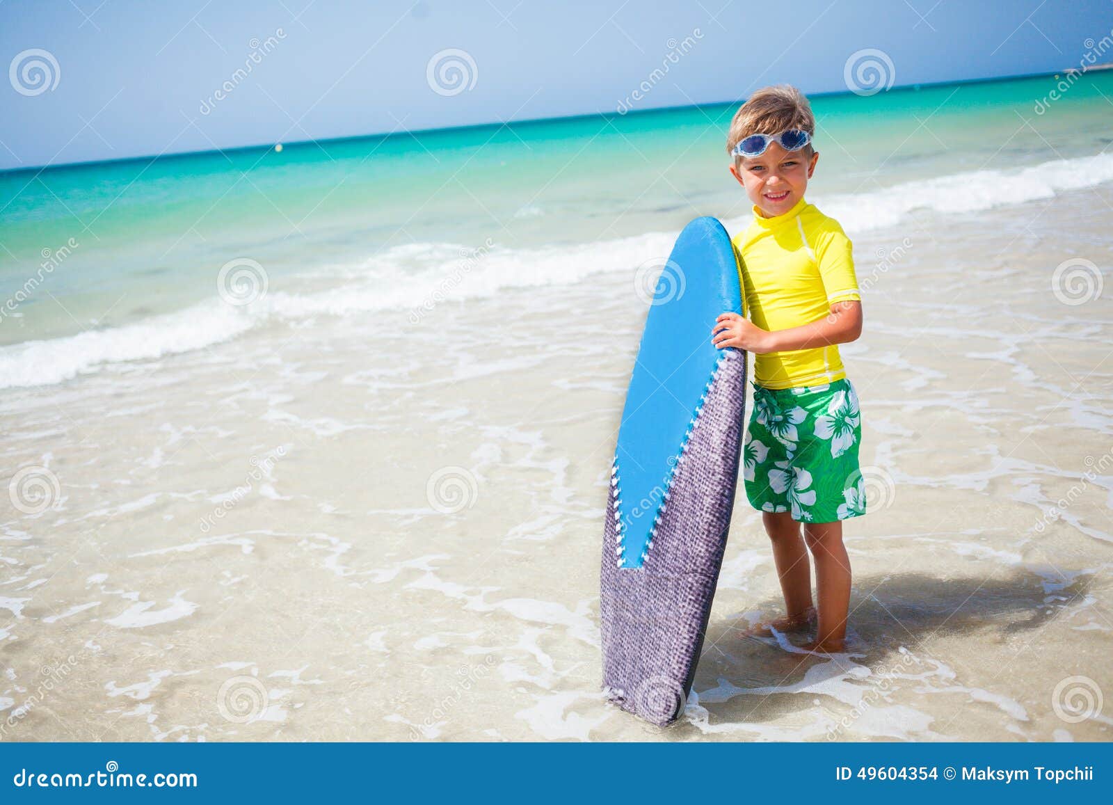 Boy with surf stock photo. Image of carry, holiday, surfboard - 49604354