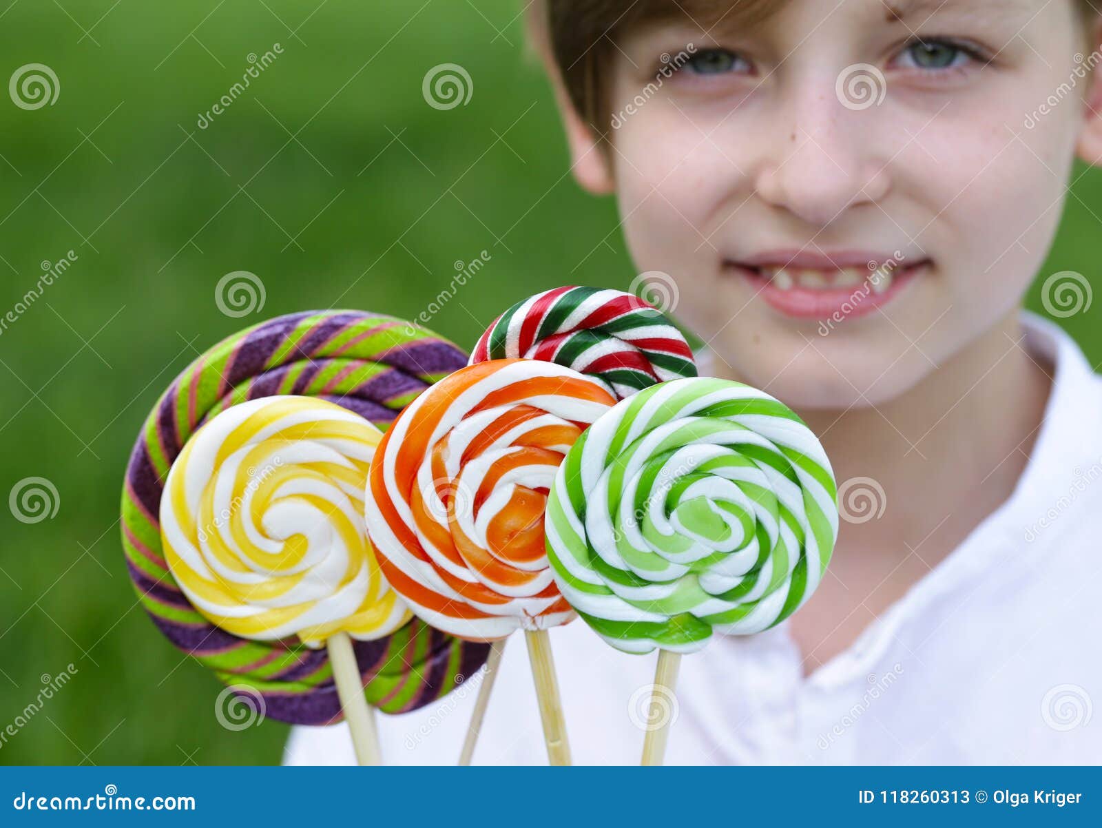 Boy with sweets stock image. Image of lolipop, young - 118260313