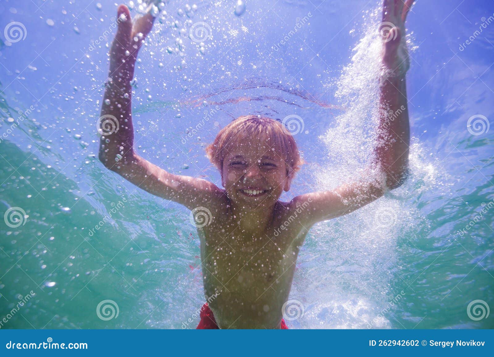 Boy Swim Underwater in the Ocean with Open Eyes Stock Photo - Image of ... Boy Swim Underwater in the Ocean with Open Eyes Stock Photo - Image of ...