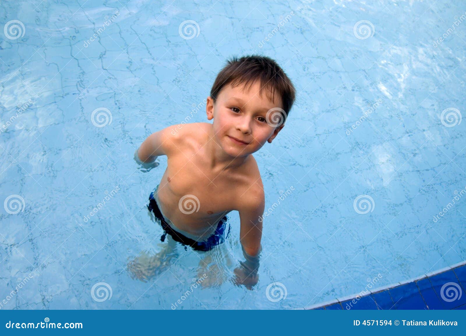 Boy in the swimming-pool stock photo. Image of health - 4571594
