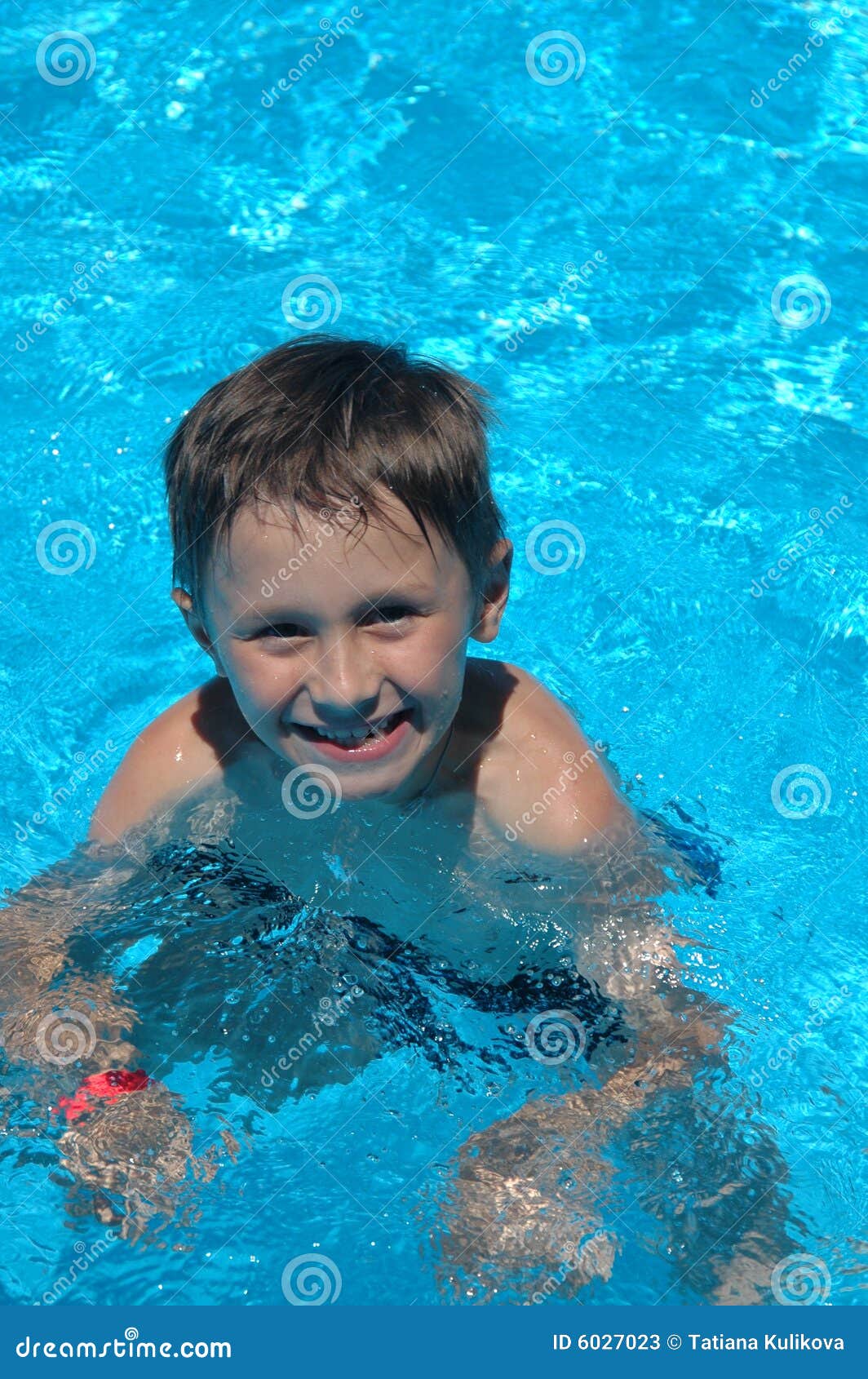 Boy in the swimming-pool stock image. Image of childish - 6027023