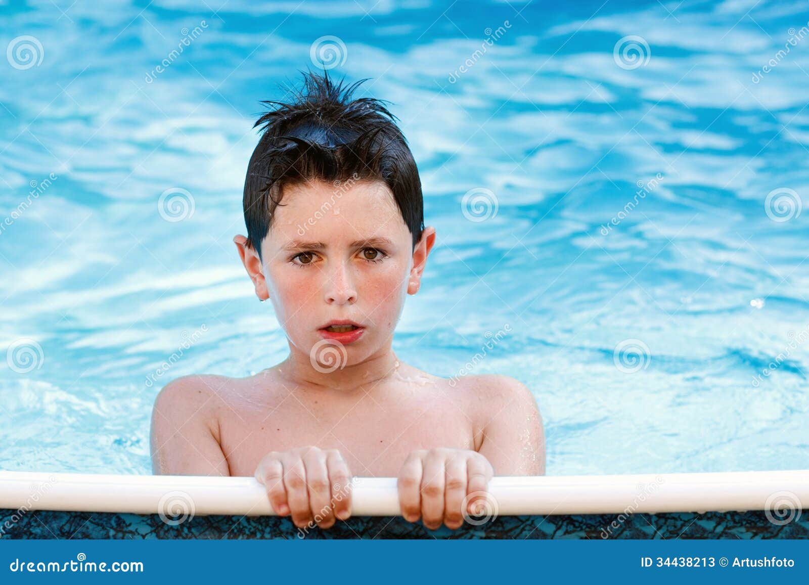 Boy in the swimming pool stock image. Image of leisure - 34438213
