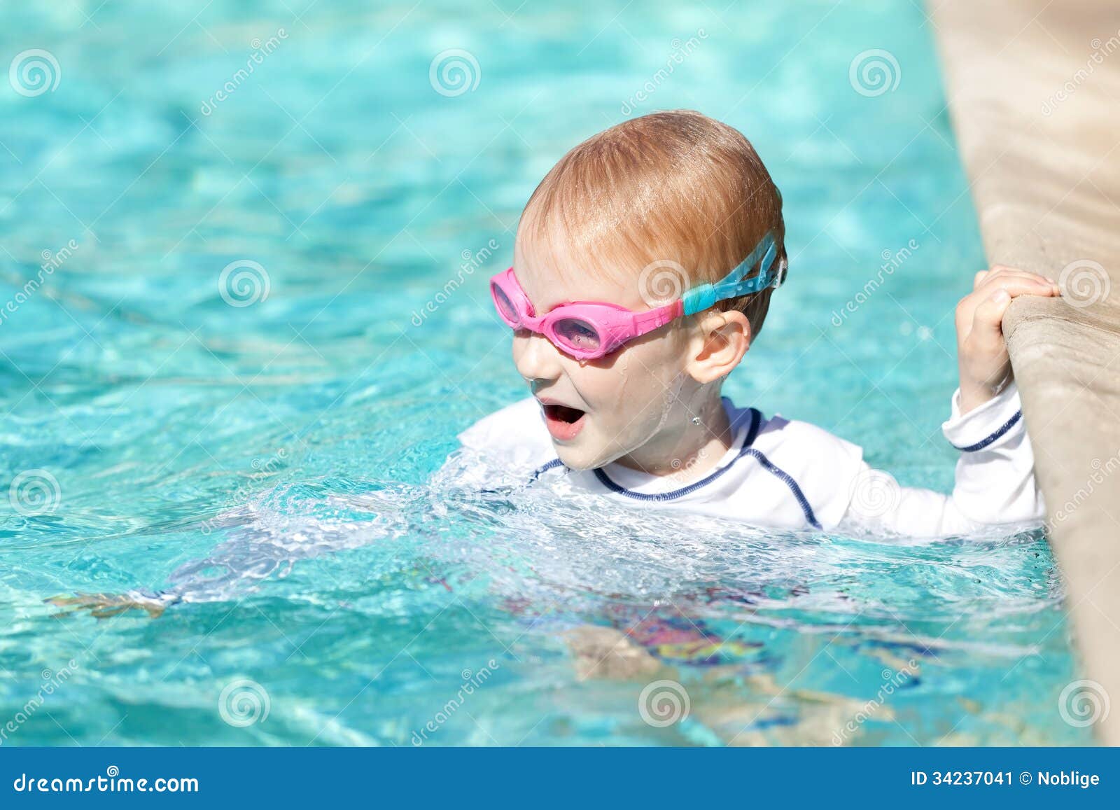 Boy in the swimming pool stock image. Image of happy - 34237041