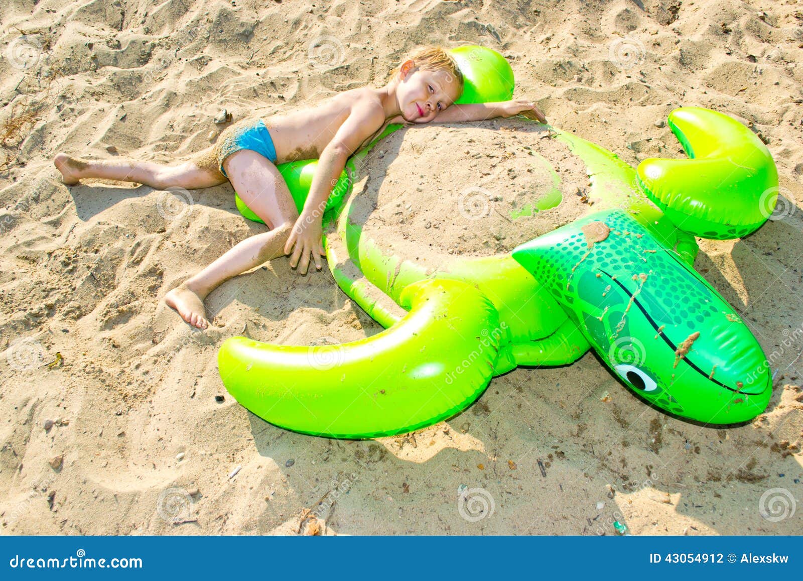 Boy Swimming in the River with Inflatable Tur Stock Photo - Image of ...