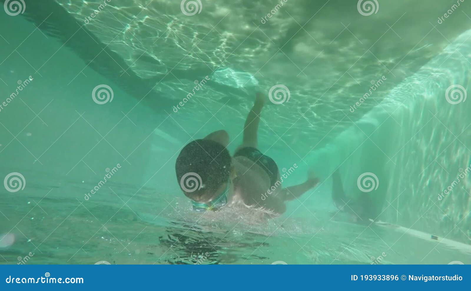 The Boy is Swimming and Rotating in the Pool Stock Footage - Video of ...