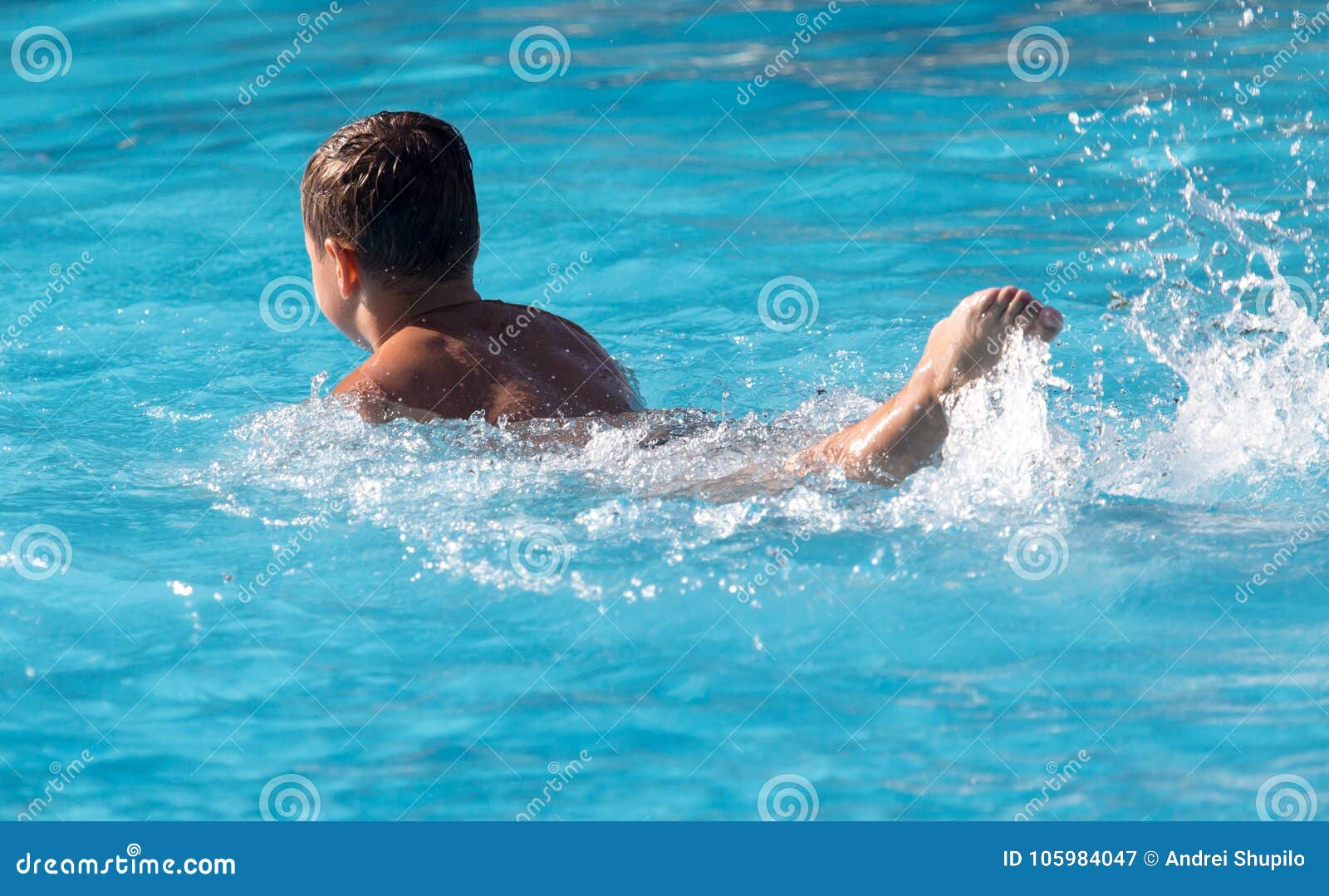 Boy Swims with a Splash in the Water Park Stock Image - Image of ...