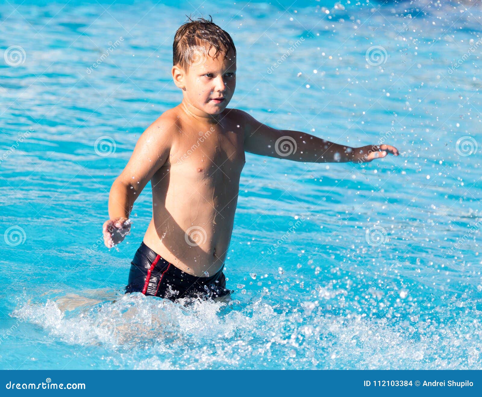 Boy Swims with a Splash in the Water Park Stock Photo - Image of little ...