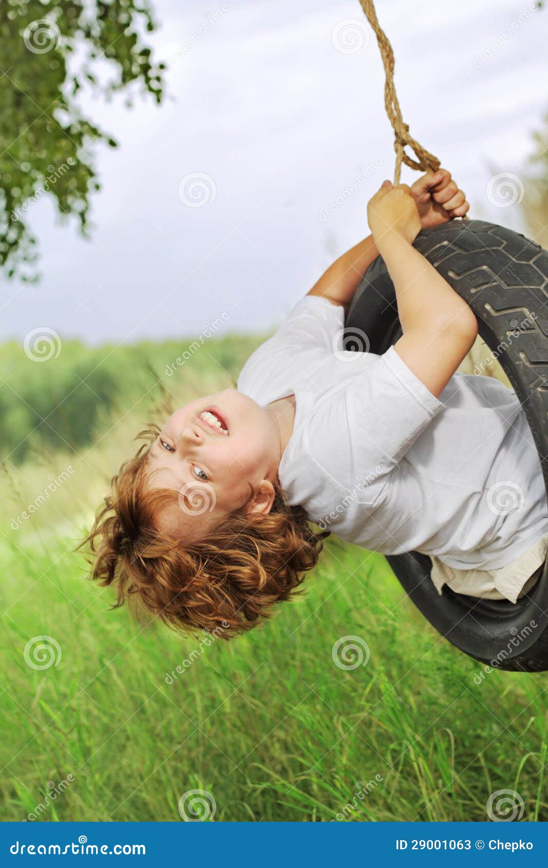 Boy on swing stock image. Image of carefree, people, nature - 29001063