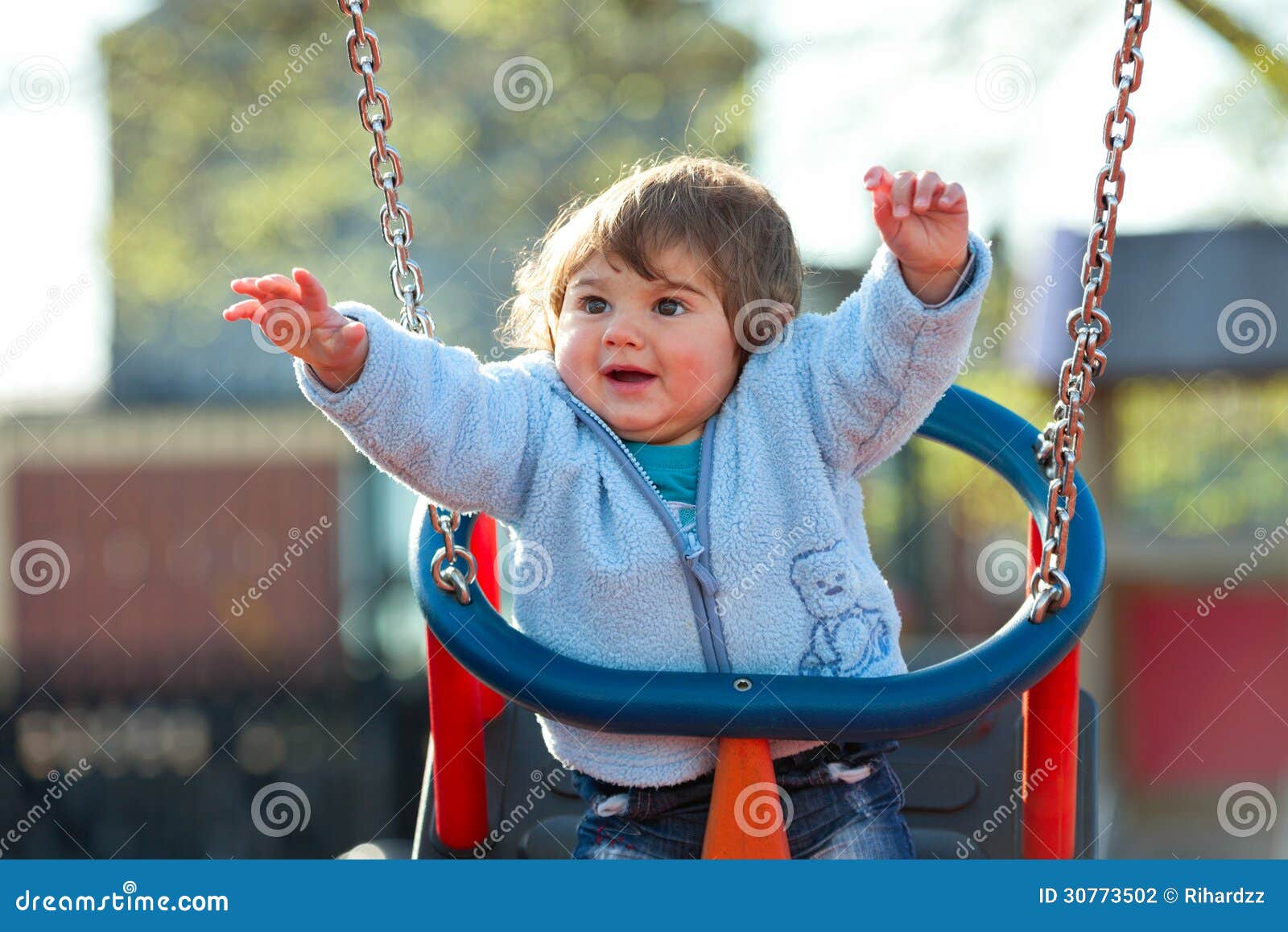 Boy on the swing stock photo. Image of toddler, happy - 30773502