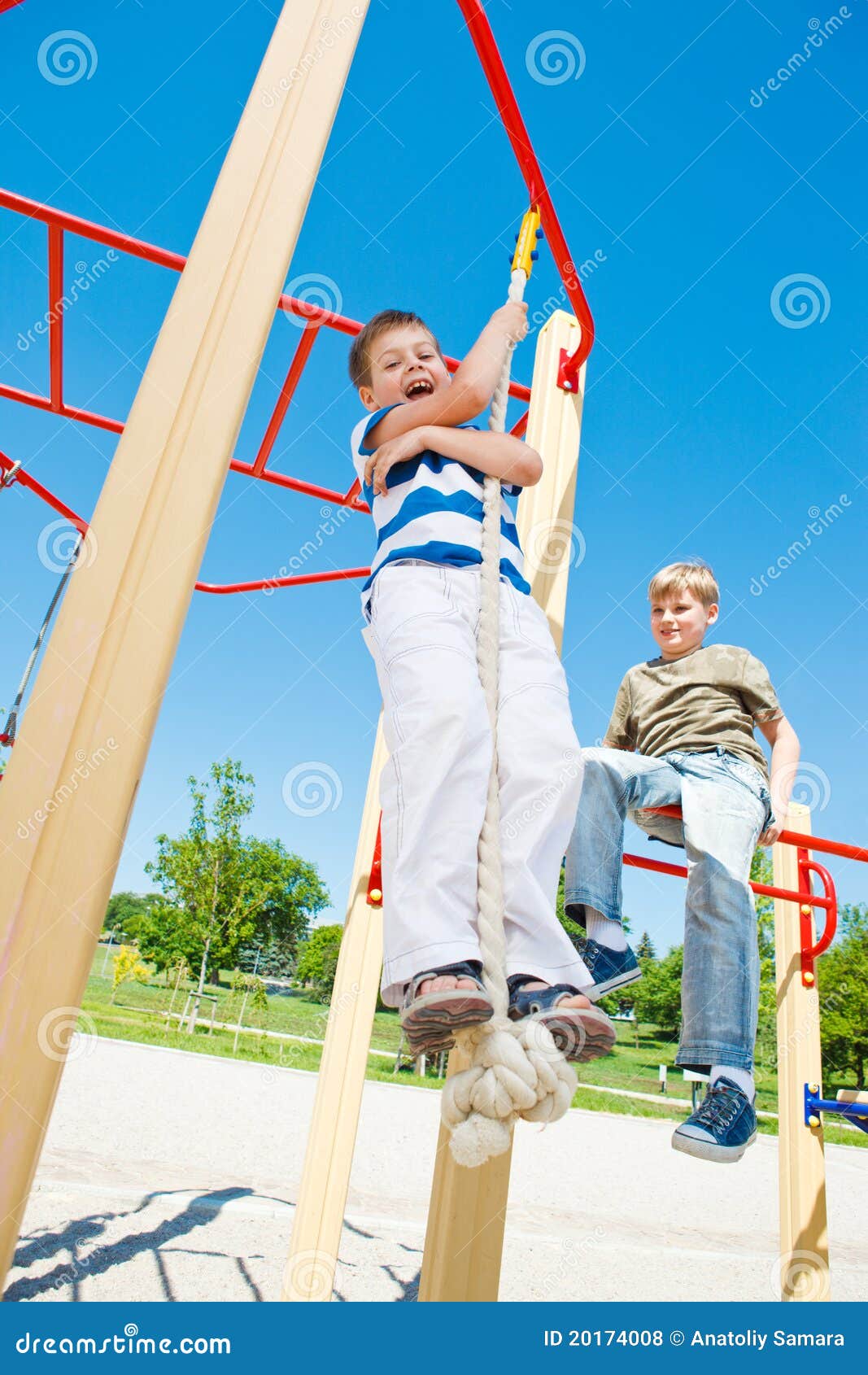 Boy swinging on the rope stock photo. Image of excited - 20174008