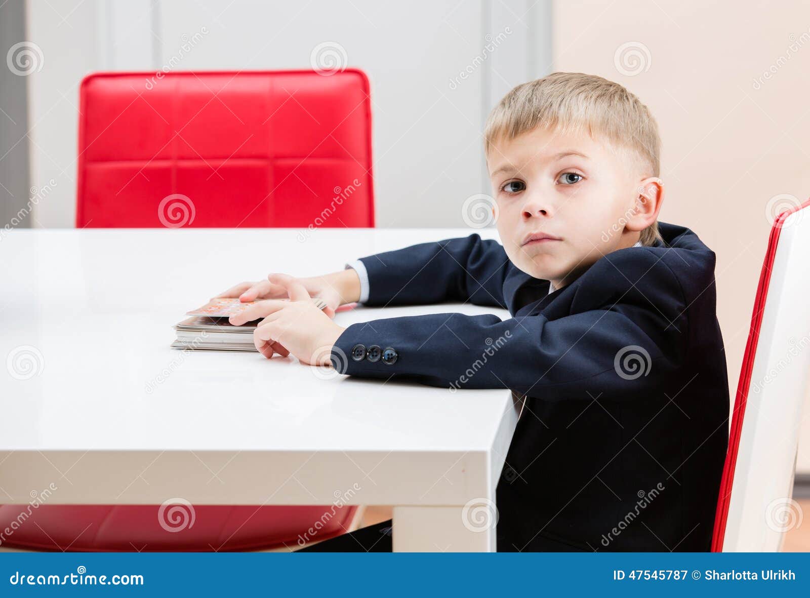 The Boy at the Table with Deck Pictures Stock Image - Image of growth ...