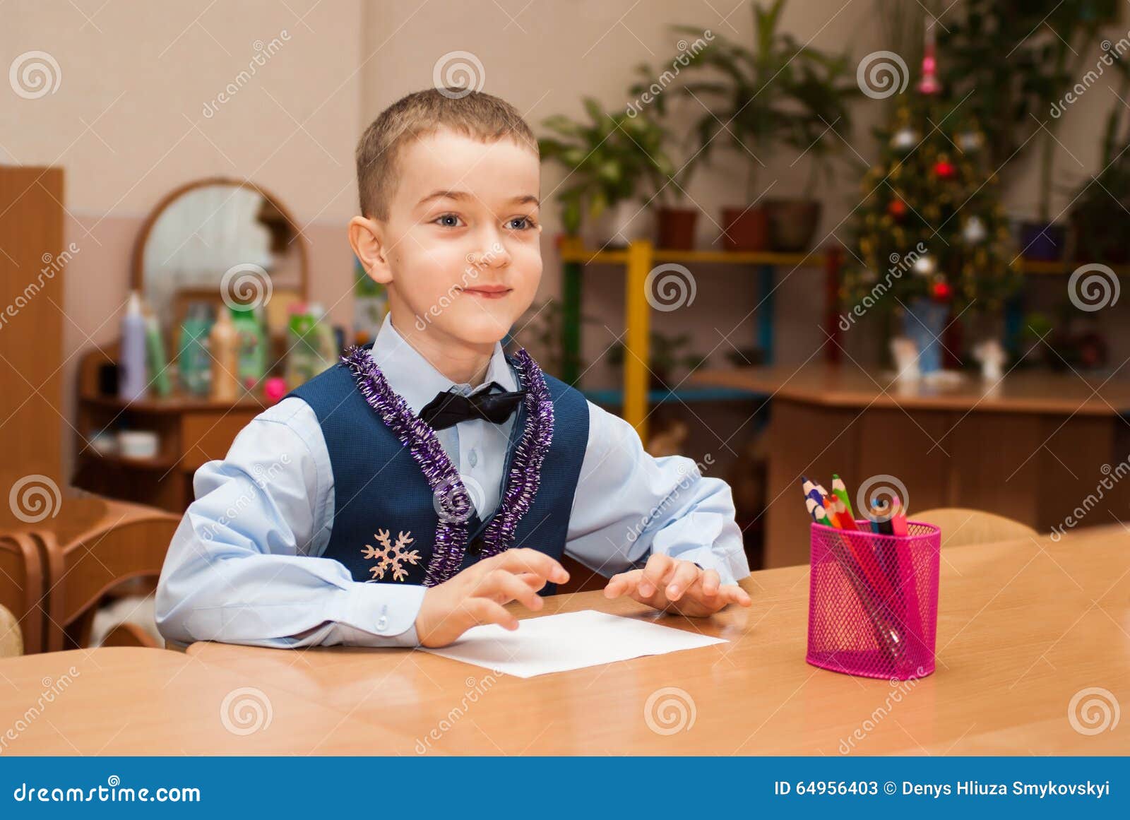 Boy at the table stock image. Image of christmas, close - 64956403