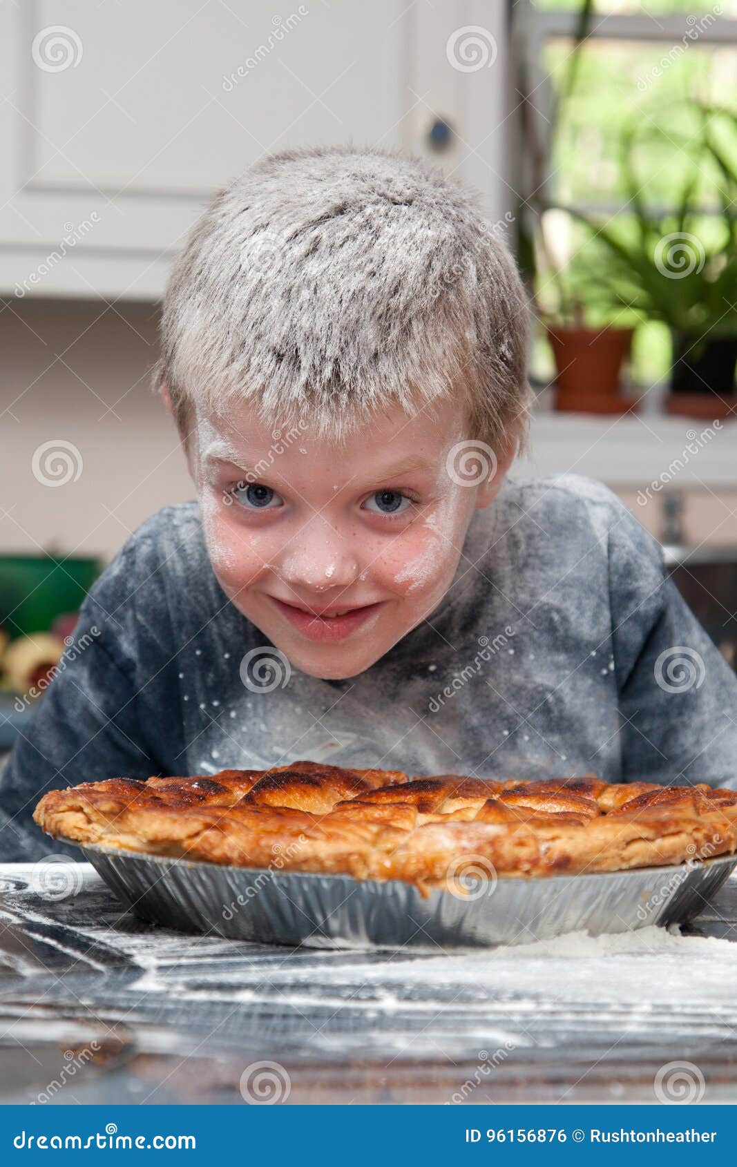 Boy at Table with Pie in Front of Him Stock Photo - Image of cute ...