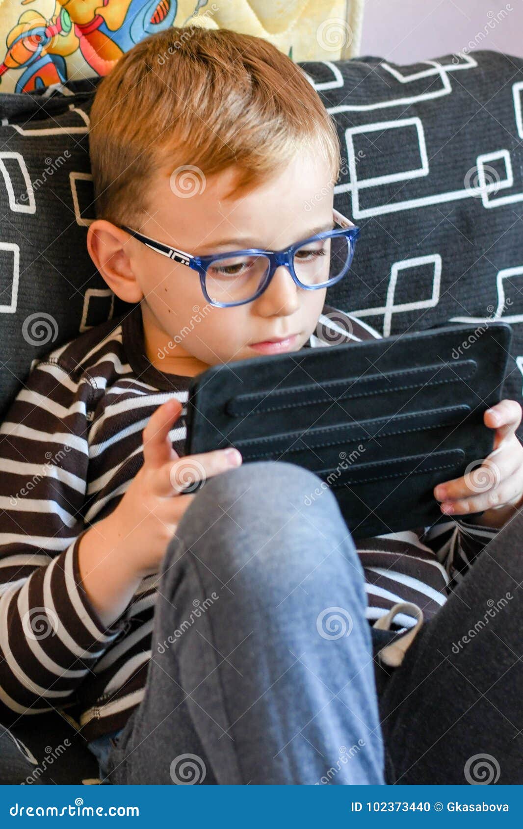 Boy with tablet stock photo. Image of lips, light, cute - 102373440