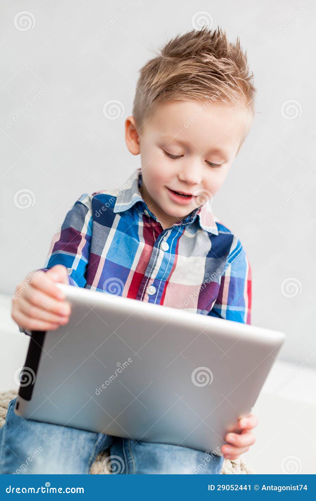 Boy with tablet pc stock image. Image of mobile, child - 29052441